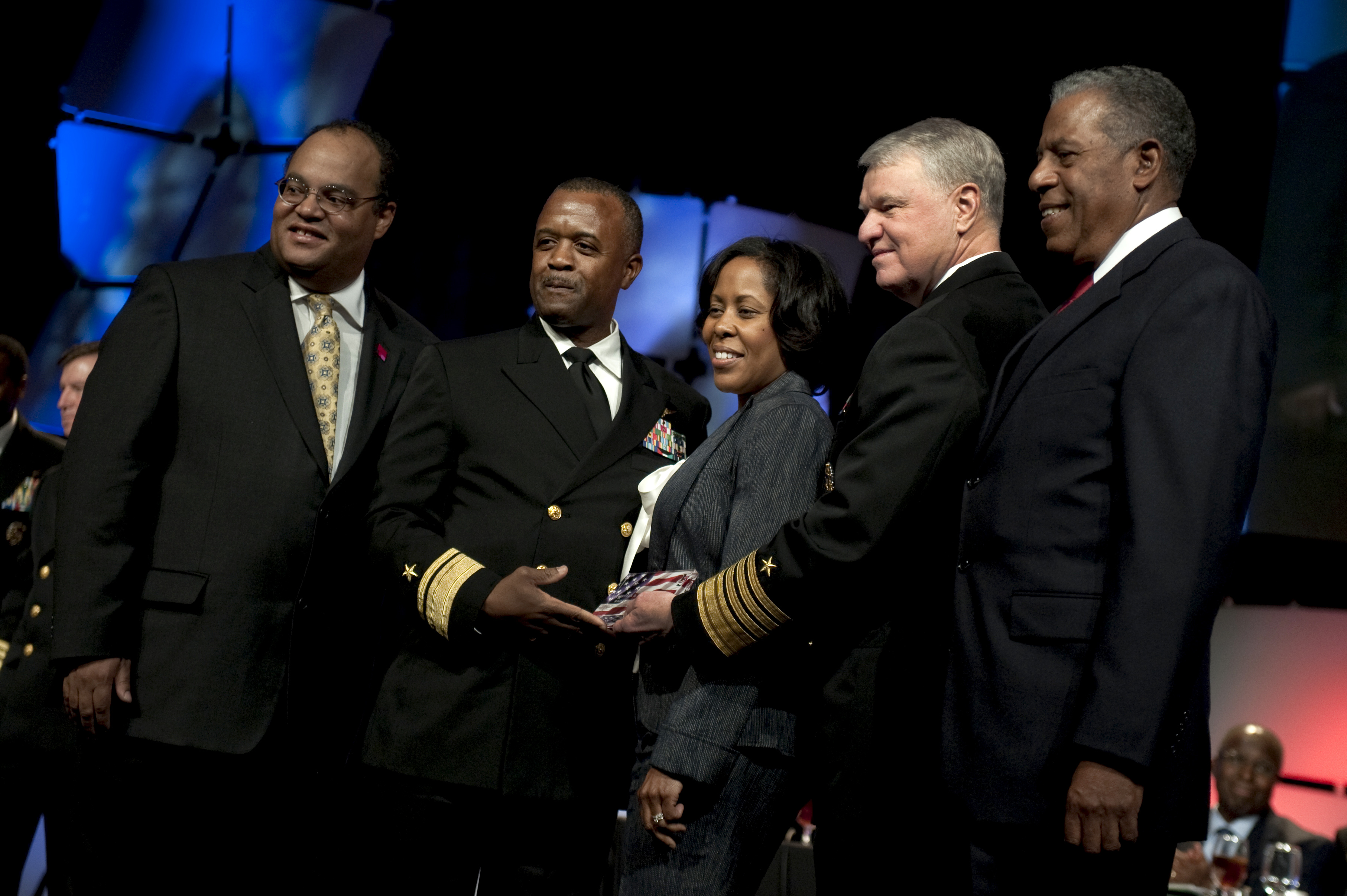 Navy Adm. Gary Roughead, chief of Naval Operations, presents Rear Adm ...
