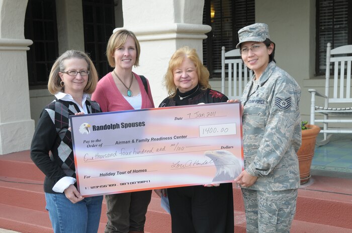 Holiday Tour of Homes check presentation
