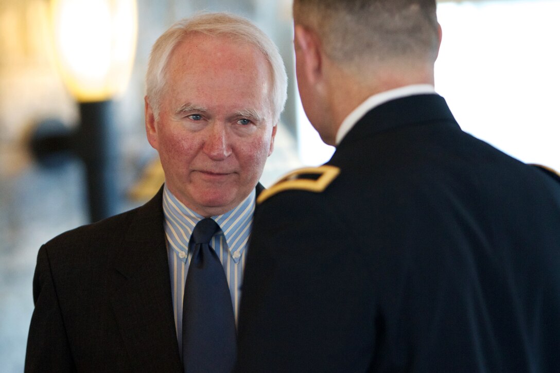 Former U.S. Embassy Senior Political Officer Victor Tomseth talks with ...
