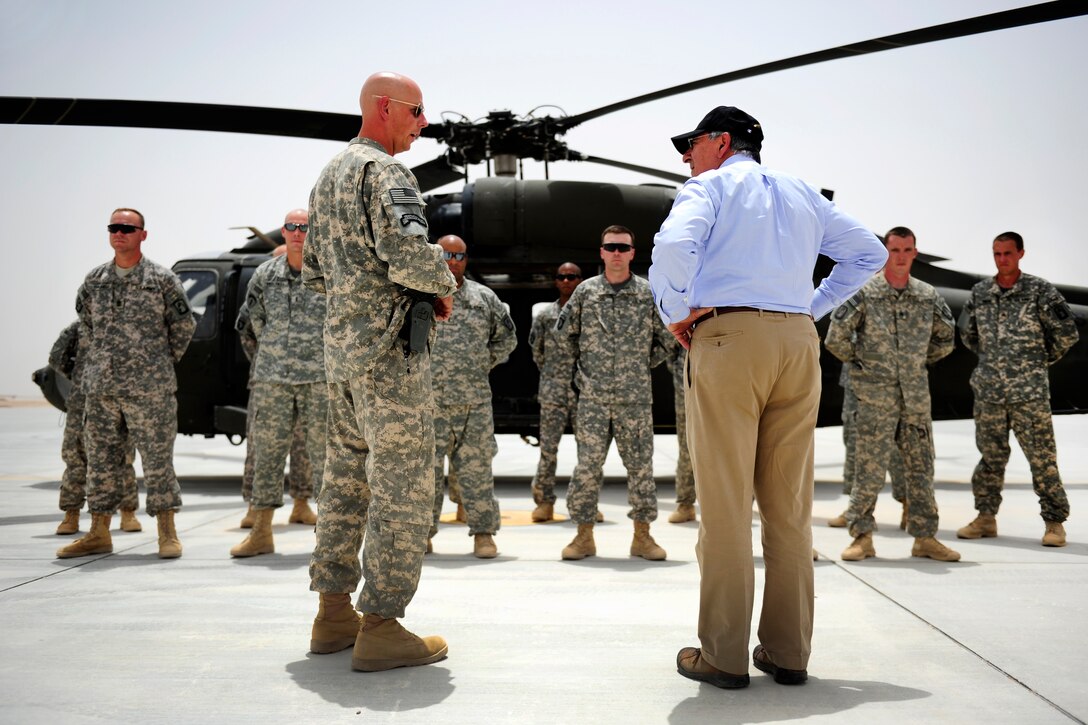 U.S. Army Maj. Patrick Zenk, 1-214 Aviation Regiment, briefs U.S ...