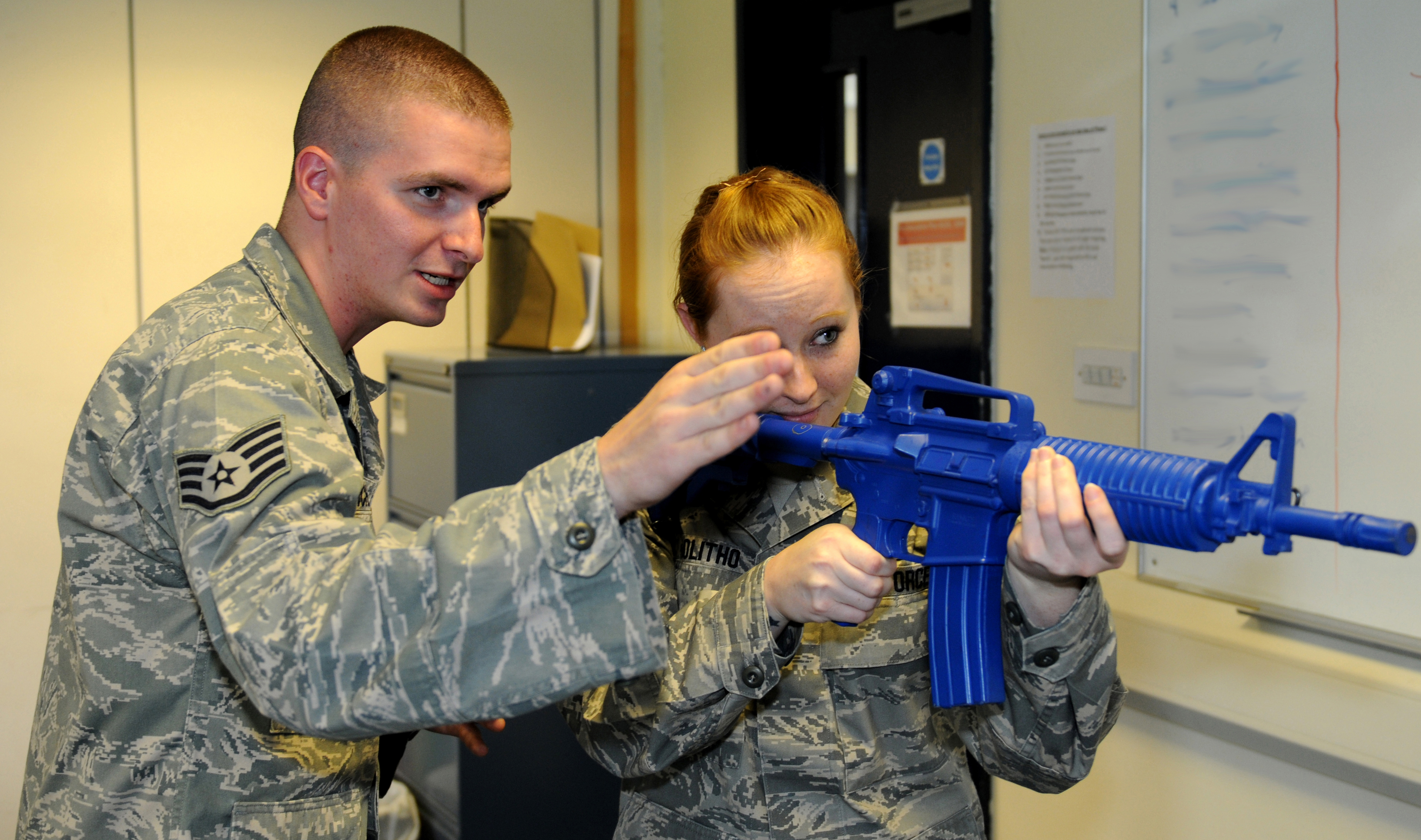 Security forces training instructor displays "Excellence in All We Do ...