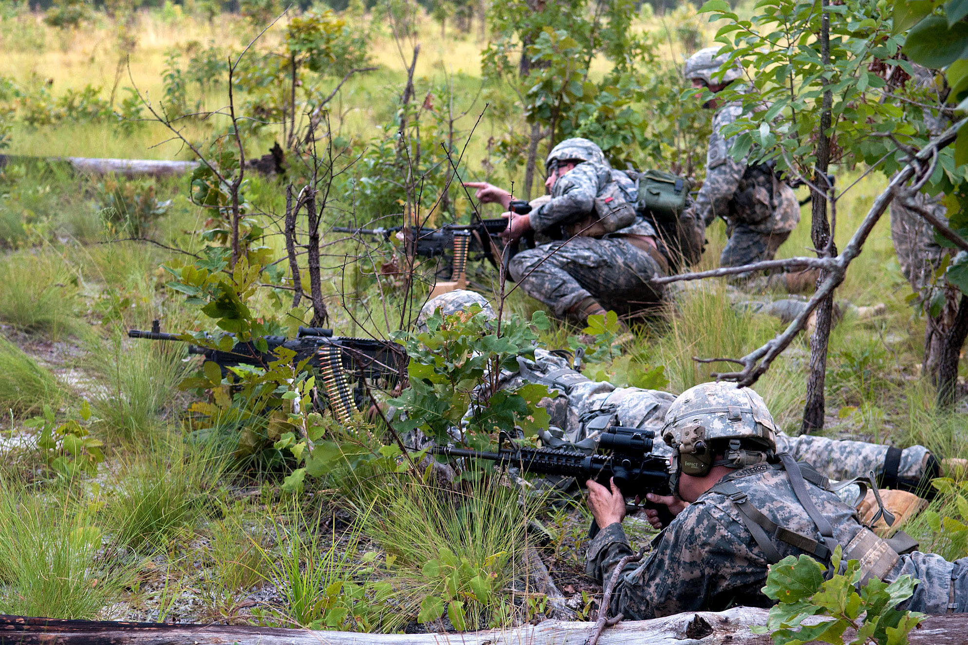 Army combat engineers fire on an enemy position during a live-fire ...