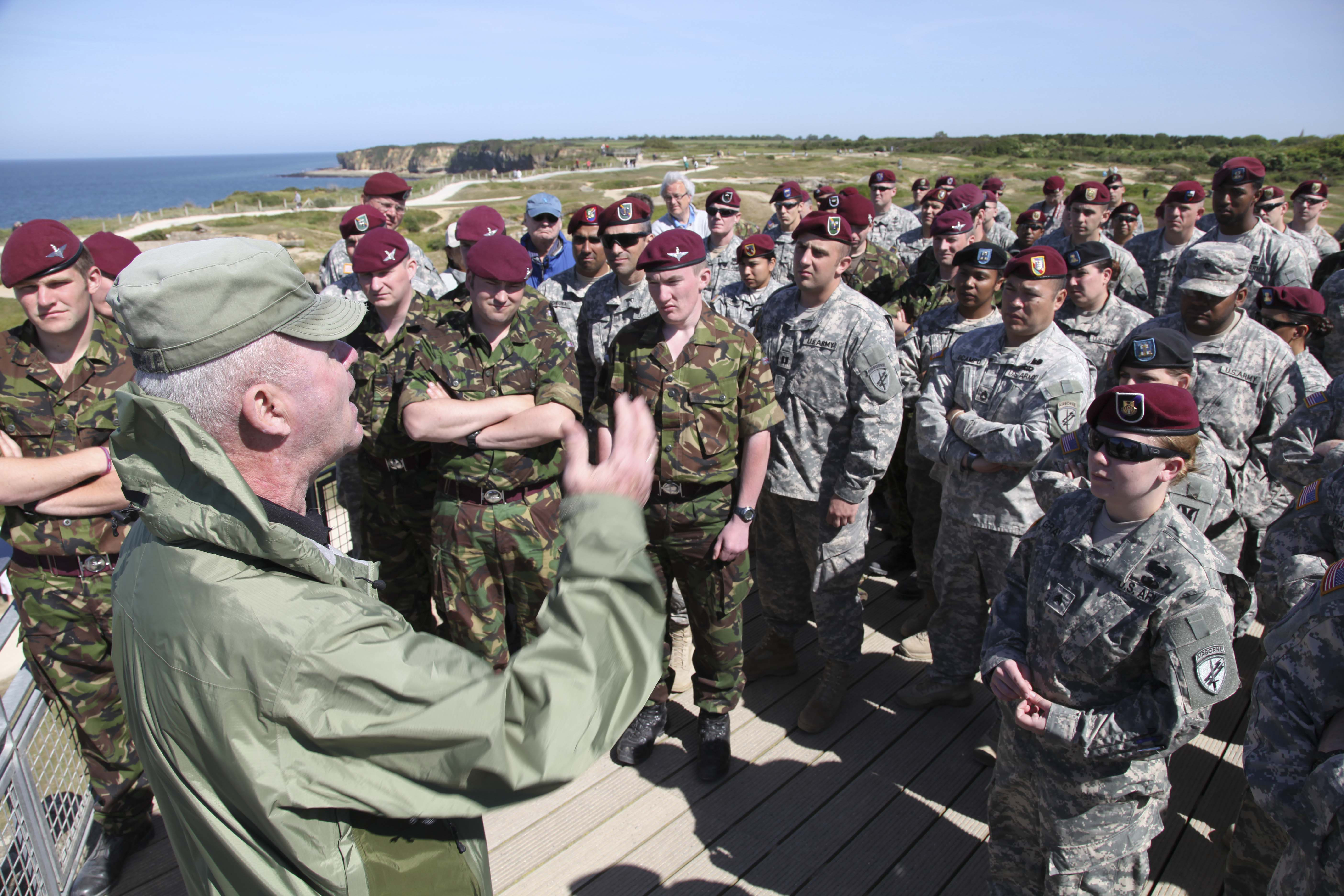 Keith Nightengale, a retired Army colonel, talks to paratroopers with ...