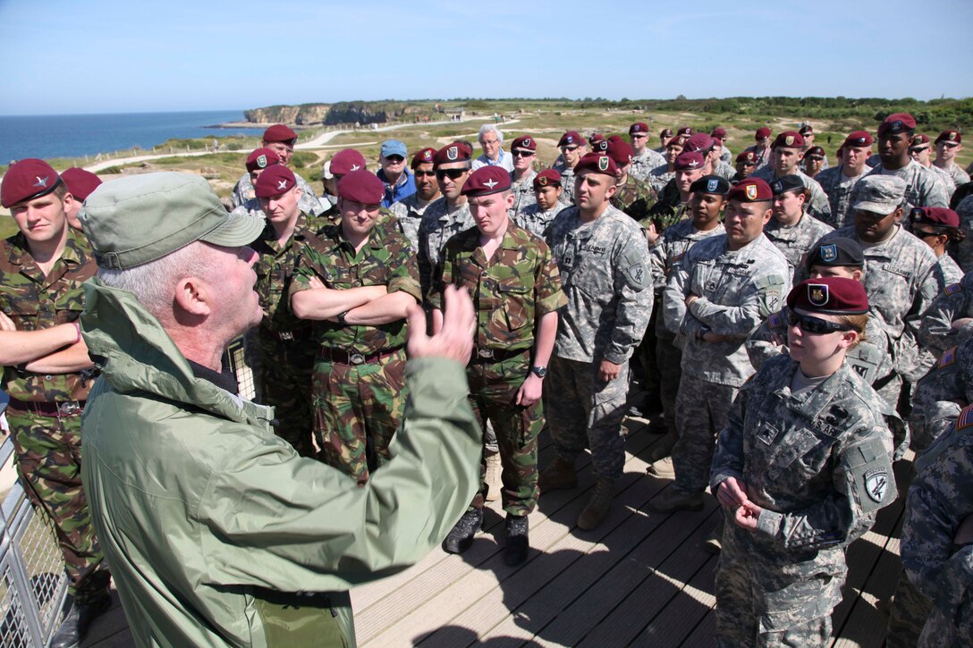 Keith Nightengale, a retired Army colonel, talks to paratroopers with ...