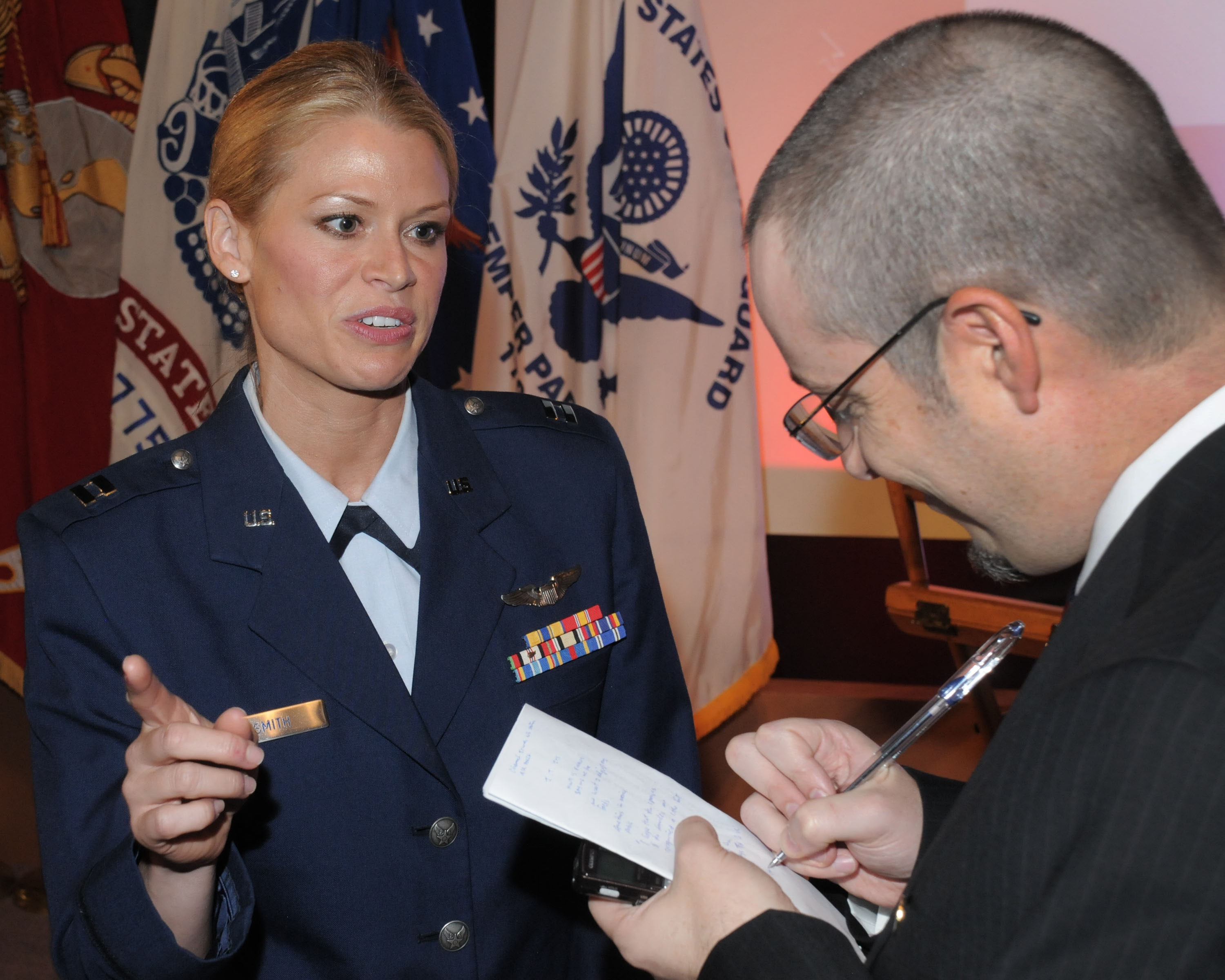 Capt. Kelly Smith shares her story with media at event with First Lady ...