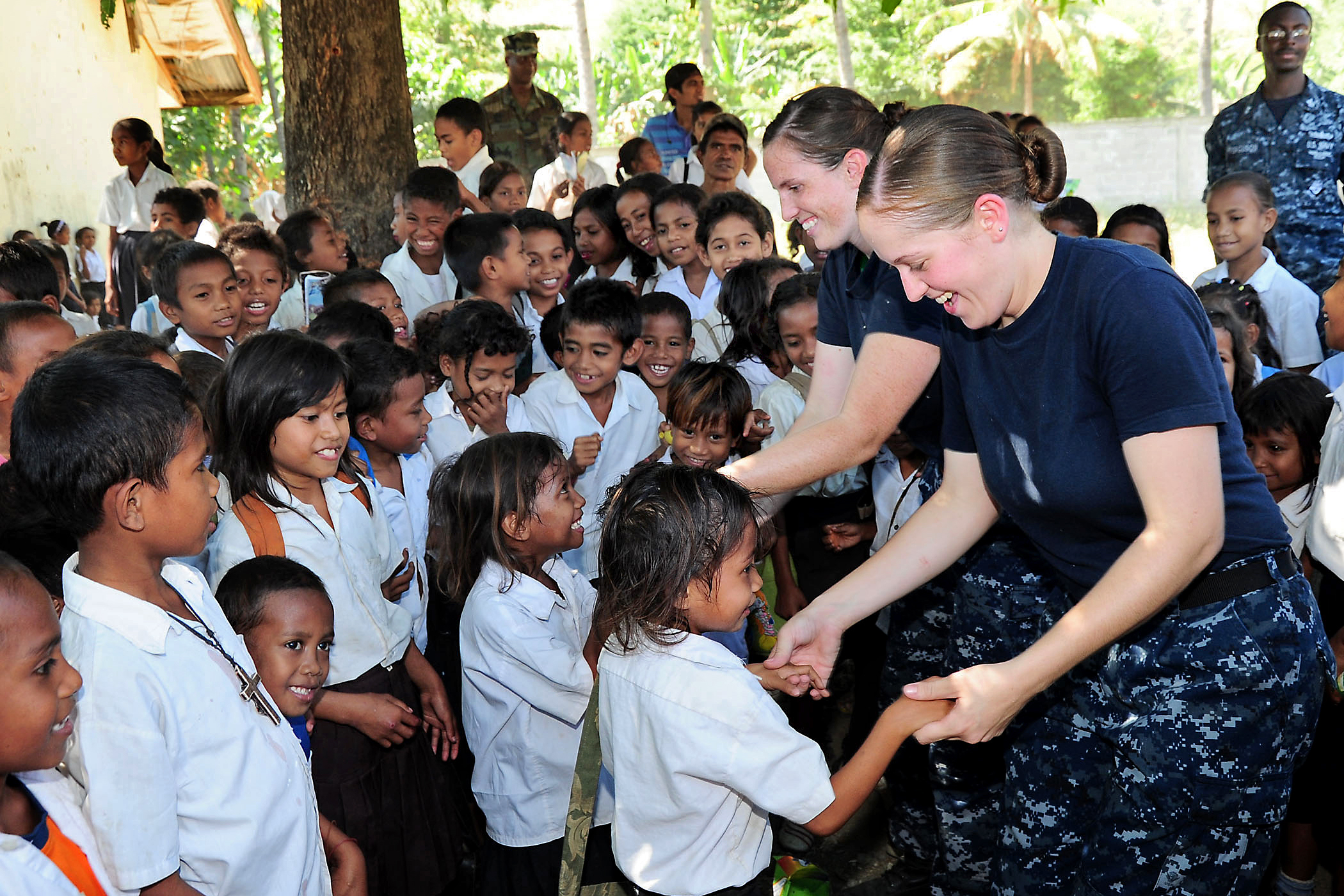 U.S. Navy Ensign Allison Luzwick, left, and Petty Officer 2nd Class ...