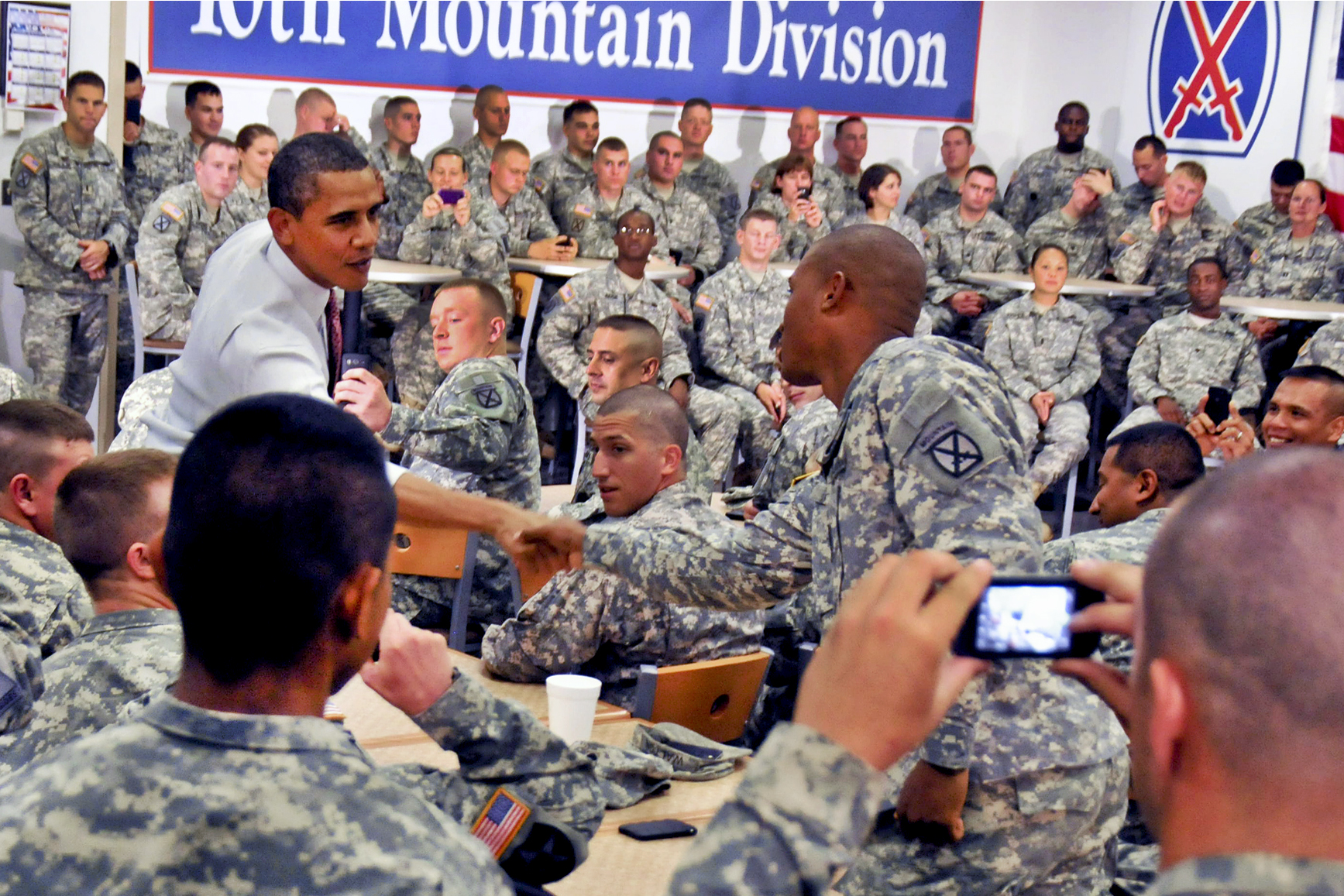 President Barack Obama shakes hands and thanks soldiers for their ...