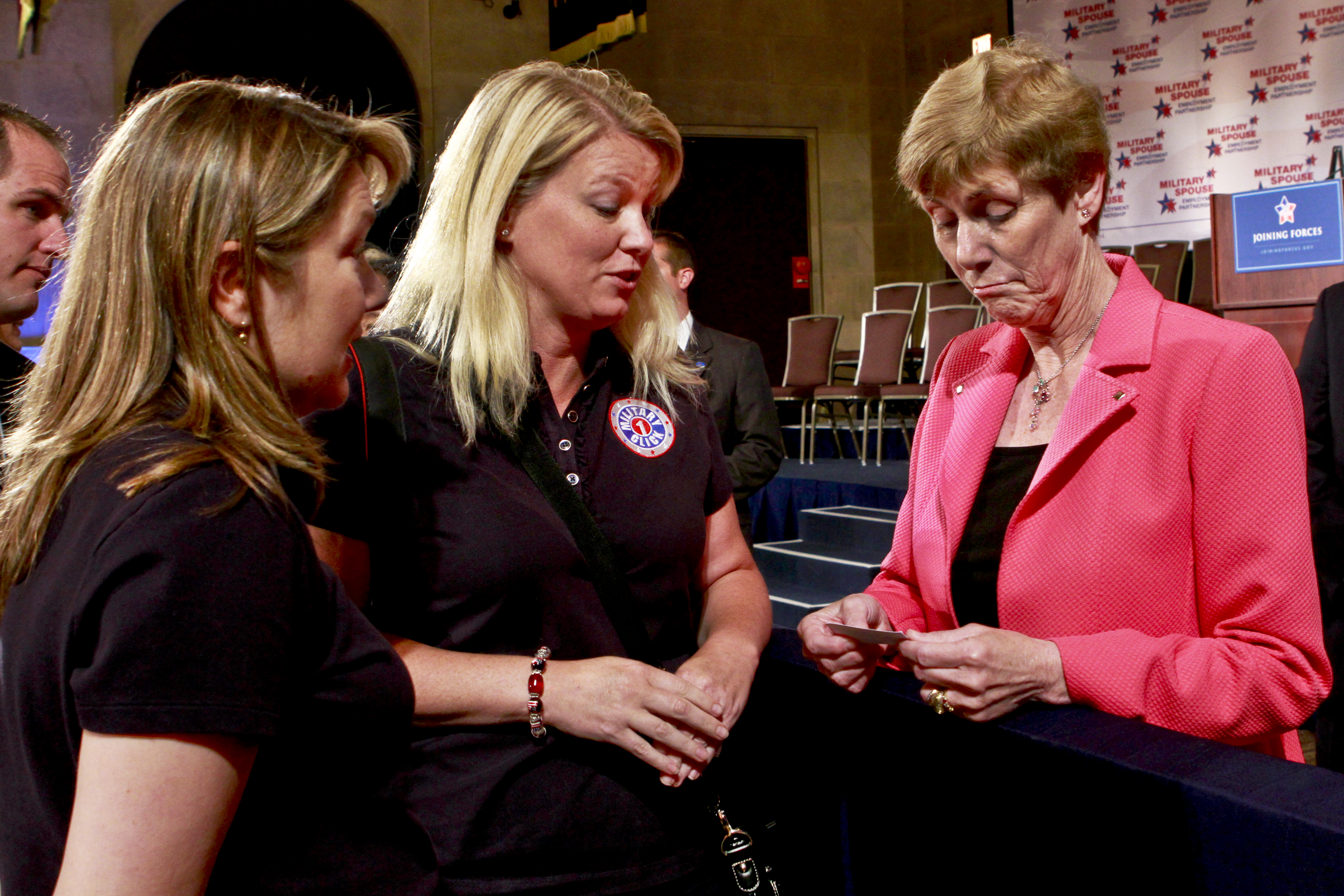 Kristi Hamrick Brown and Jennifer Pilcher, wife of Navy Cmdr. Eddie ...