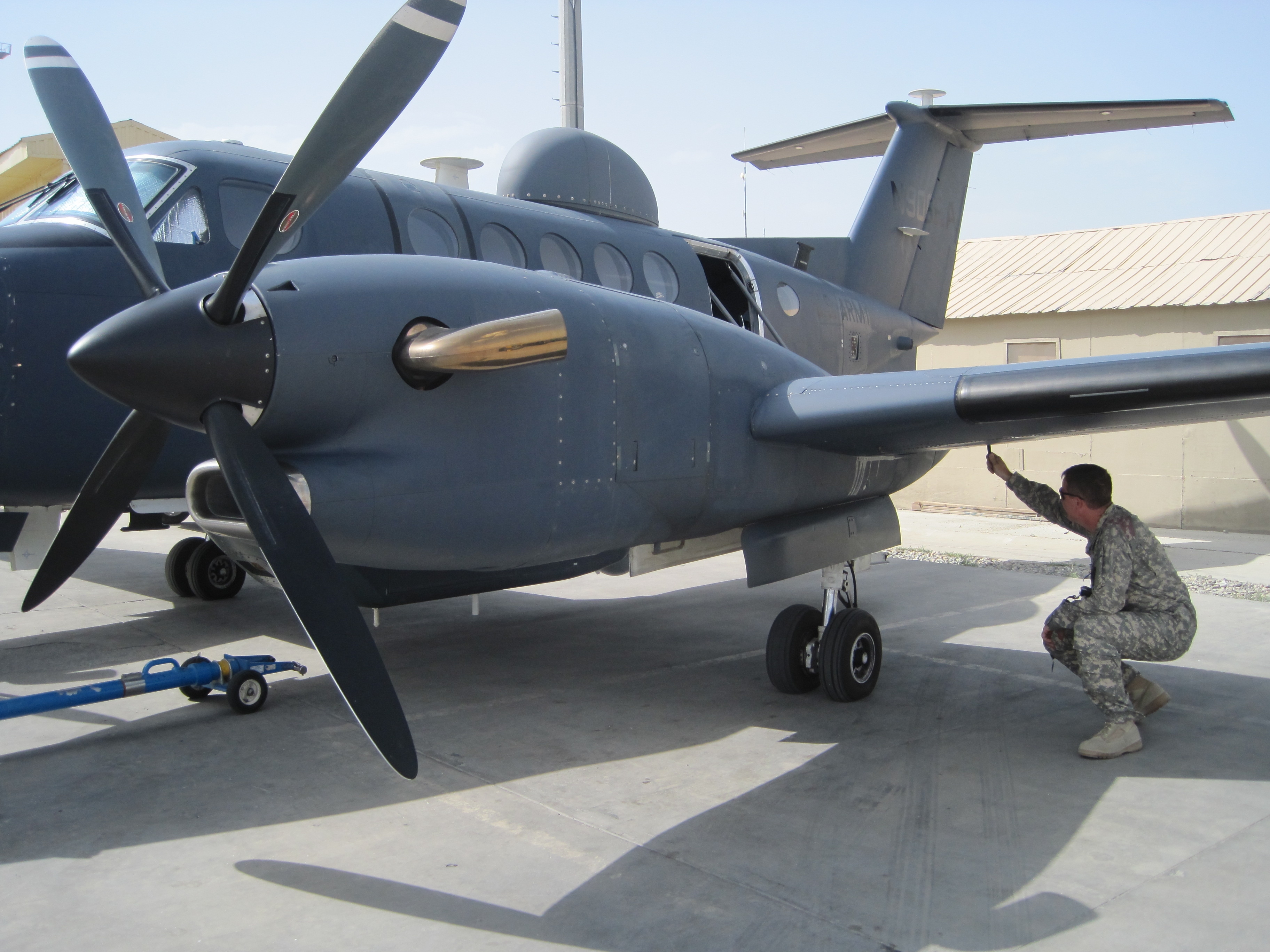 Army Chief Warrant Officer 4 John Lill of Task Force ODIN conducts a ...