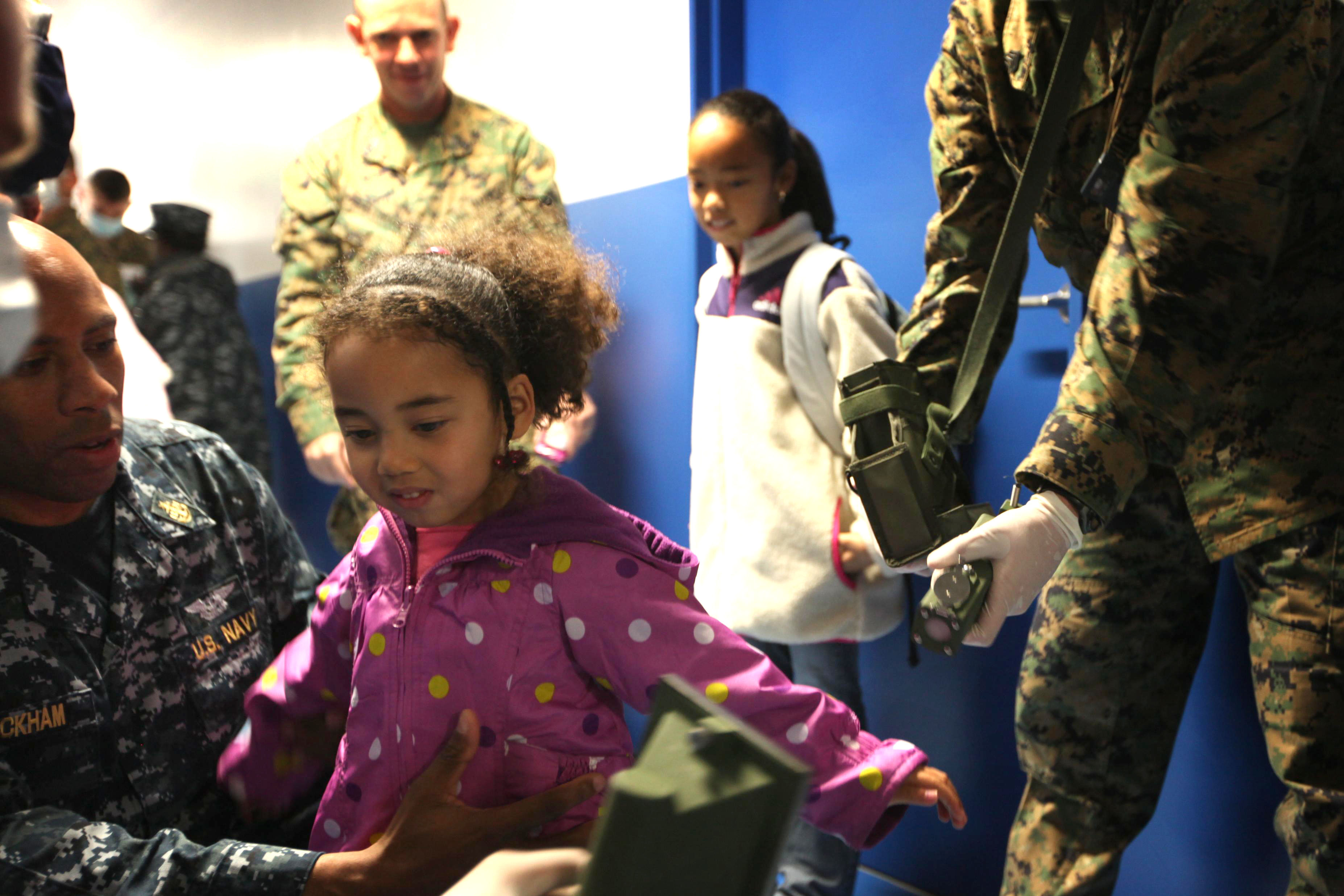 Kiera Beckham, 3, and her father, U.S. Navy Chief Petty Officer William ...