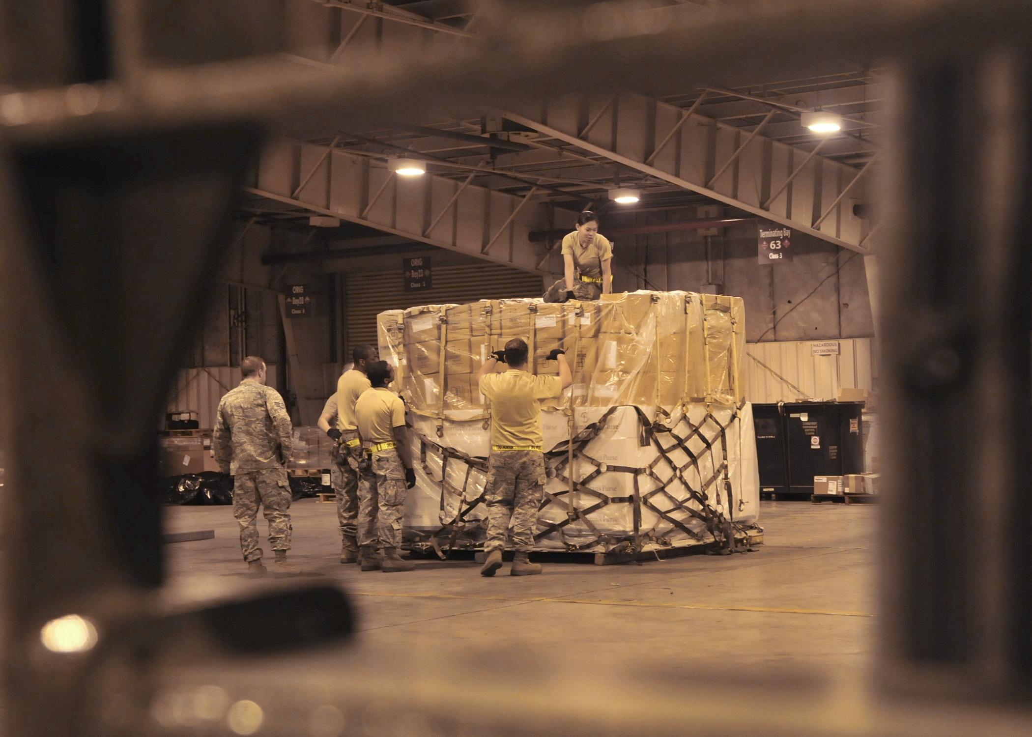 Airmen prepare relief supplies