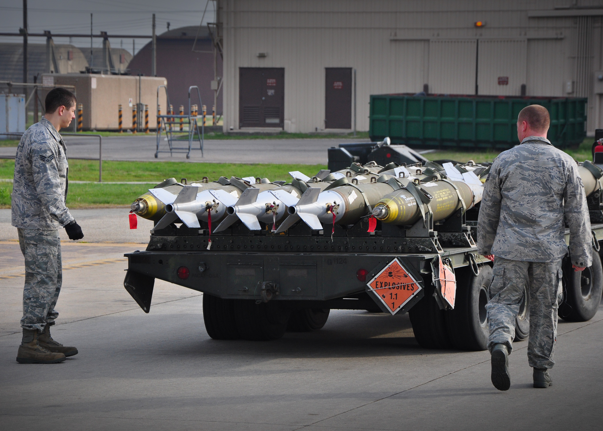 Bombs away: Airmen work together to build, load munitions