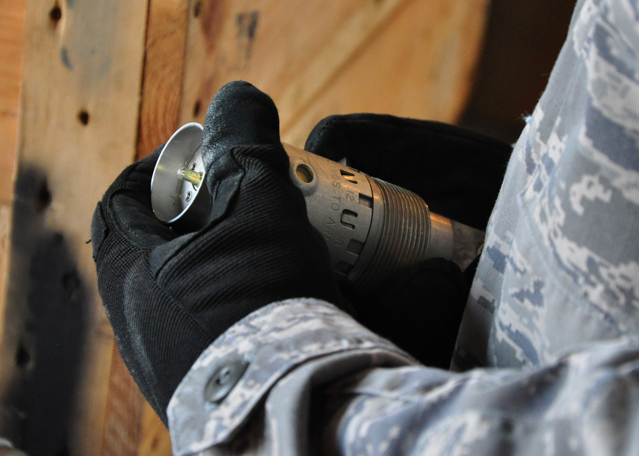 Bombs away: Airmen work together to build, load munitions