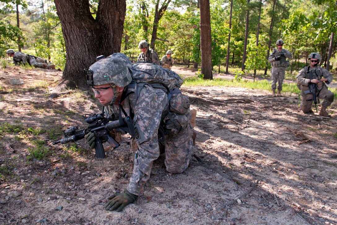 Army 1st Lt. Theron Tingstad leads a reconnaissance of an enemy ...