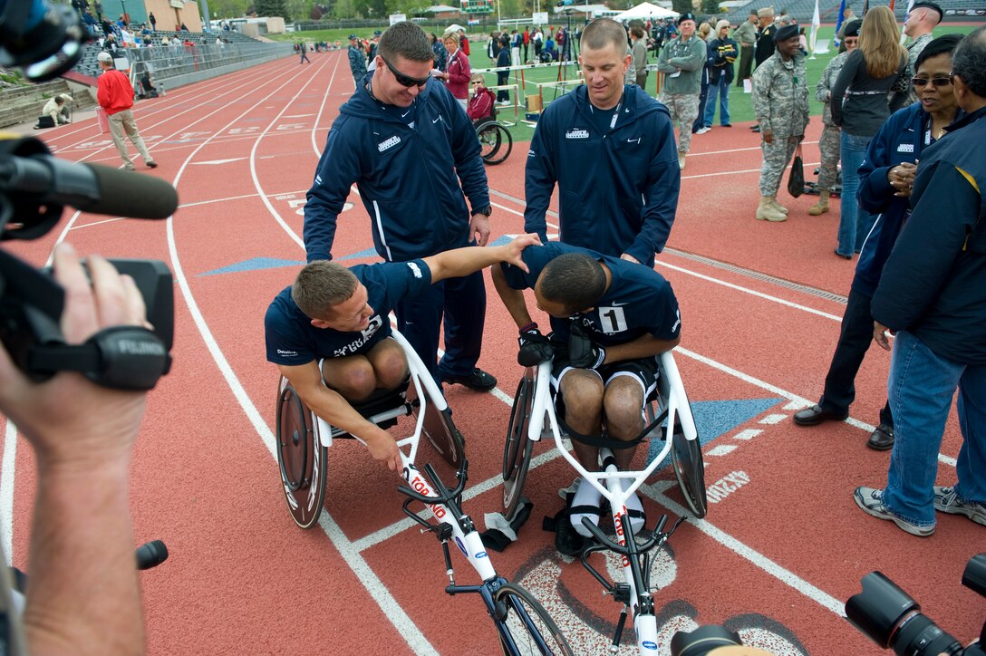 Nathan Dewalt, left, and Angelo Anderson, right, both U.S. Navy team ...