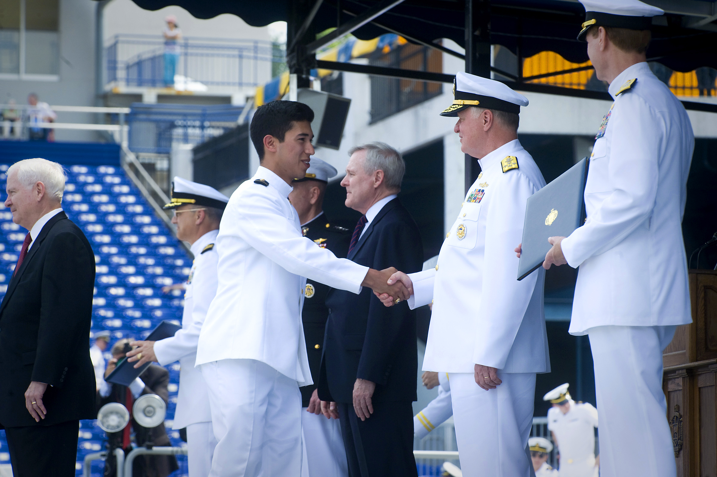 Navy Adm. Gary Roughead, chief of Naval Operations, congratulates ...