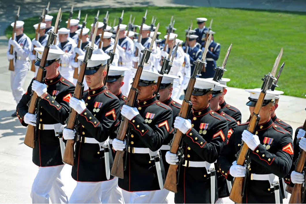 Honor guards march into position for the Memorial Day presidential ...