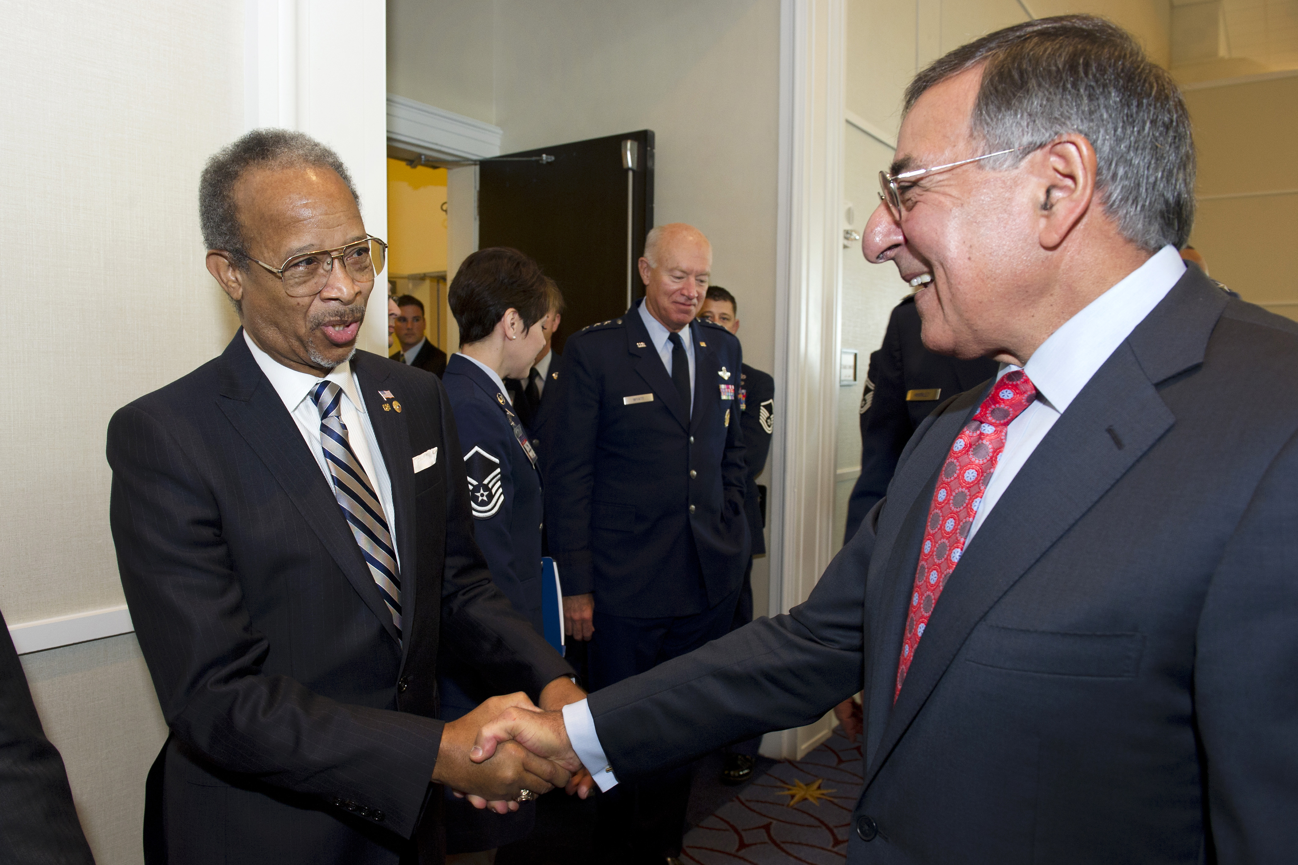 Defense Secretary Leon E. Panetta greets retired Lt. Gen. Russell Davis ...