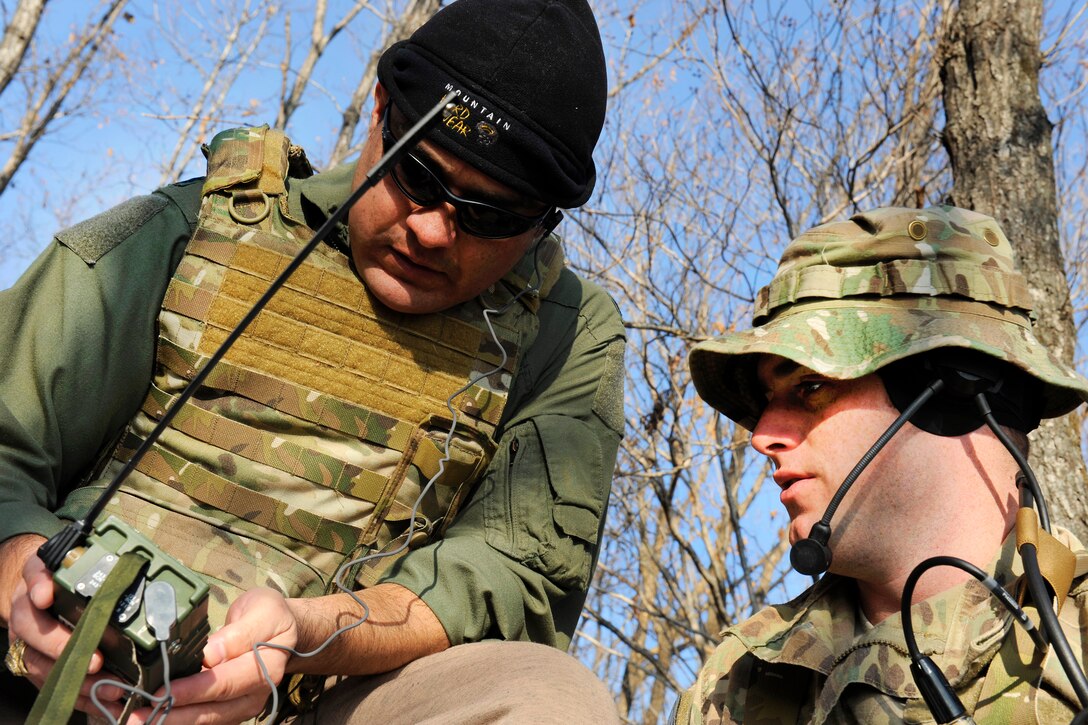 U.S. Air Force Staff Sgt. Robert Colliton, right, and Lt. Col. Pete ...