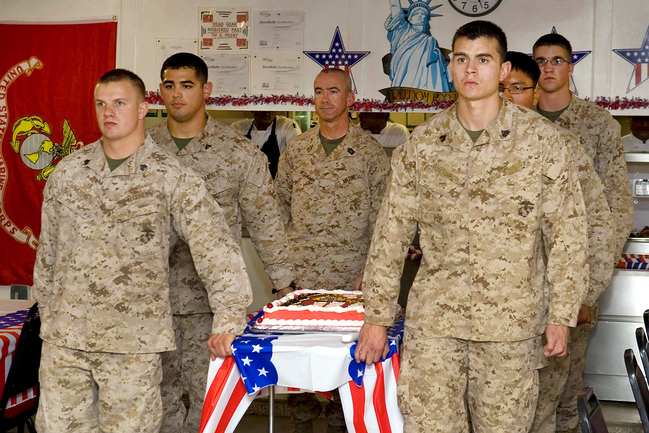 U.S. Marine Corps Col. James Morrisroe and members of his team ...