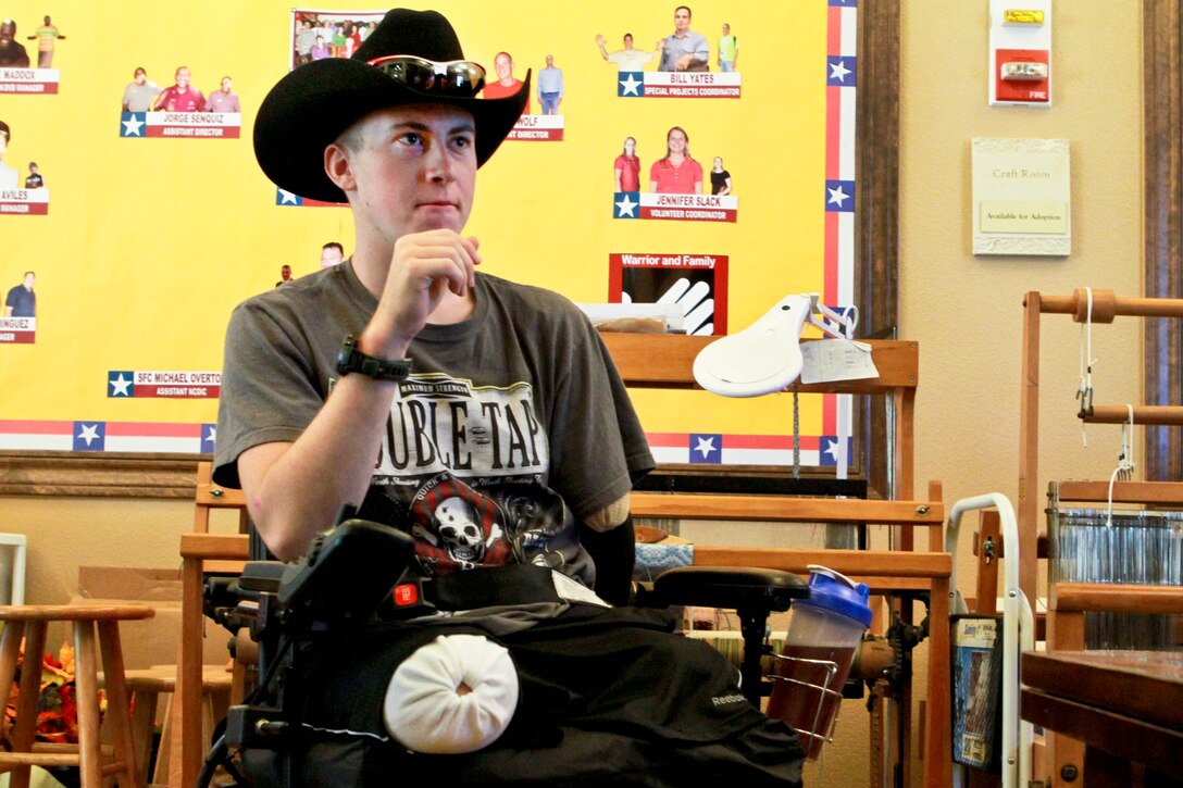 Army Pfc. Kevin Trimble, who lost both legs and an arm in a roadside ...