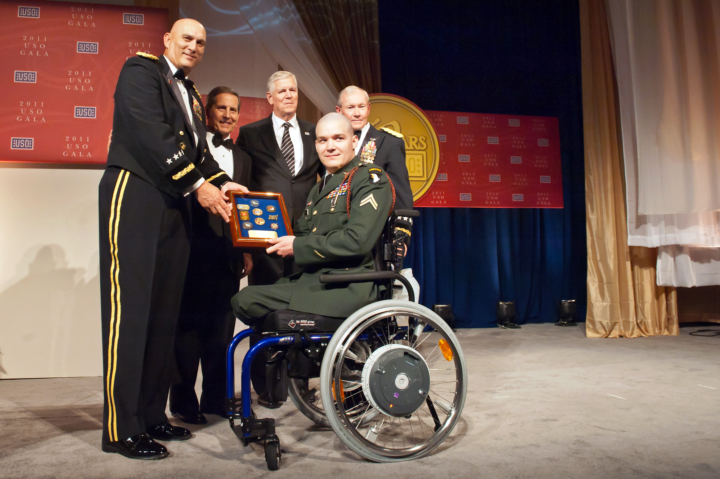 Army Cpl. David J. Bixler receives the USO Soldier of the Year Award ...