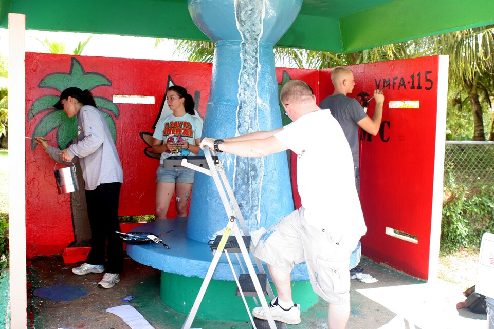 Service members help to give facelift to bus stops > United States ...