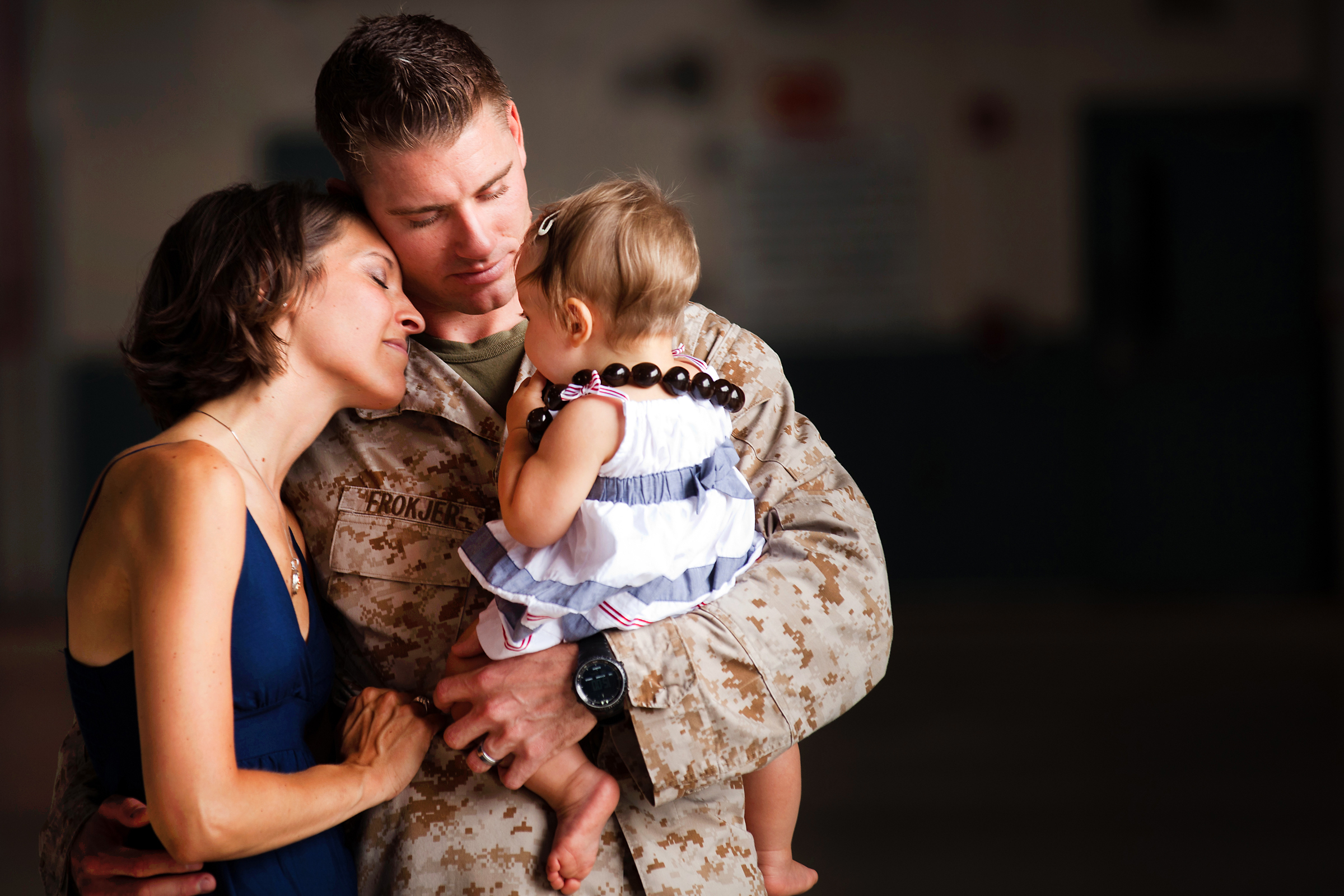 Marine Corps Capt. Lucas Frokjer reunites with his family on Marine ...