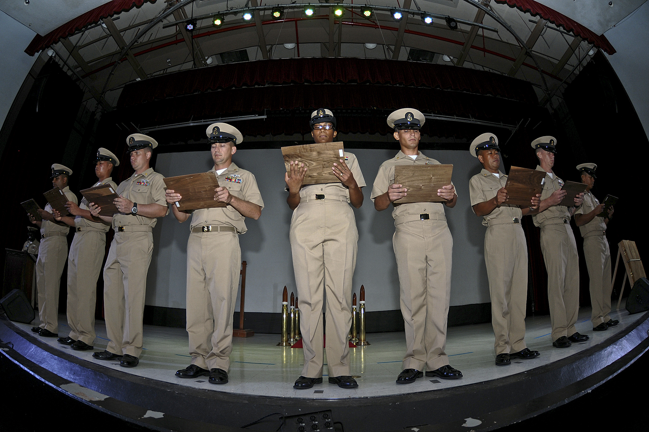 Newly-pinned U.S. Navy chief petty officers listen to the "Chief Petty ...