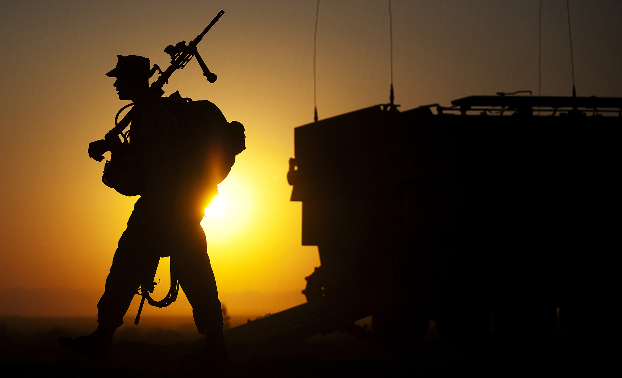 U.S. Marine Corps Lance Cpl. Theodore McCormick prepares to load an ...