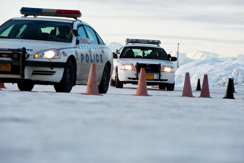 Anchorage police recruits hone emergency vehicle driving skills at JBER ...