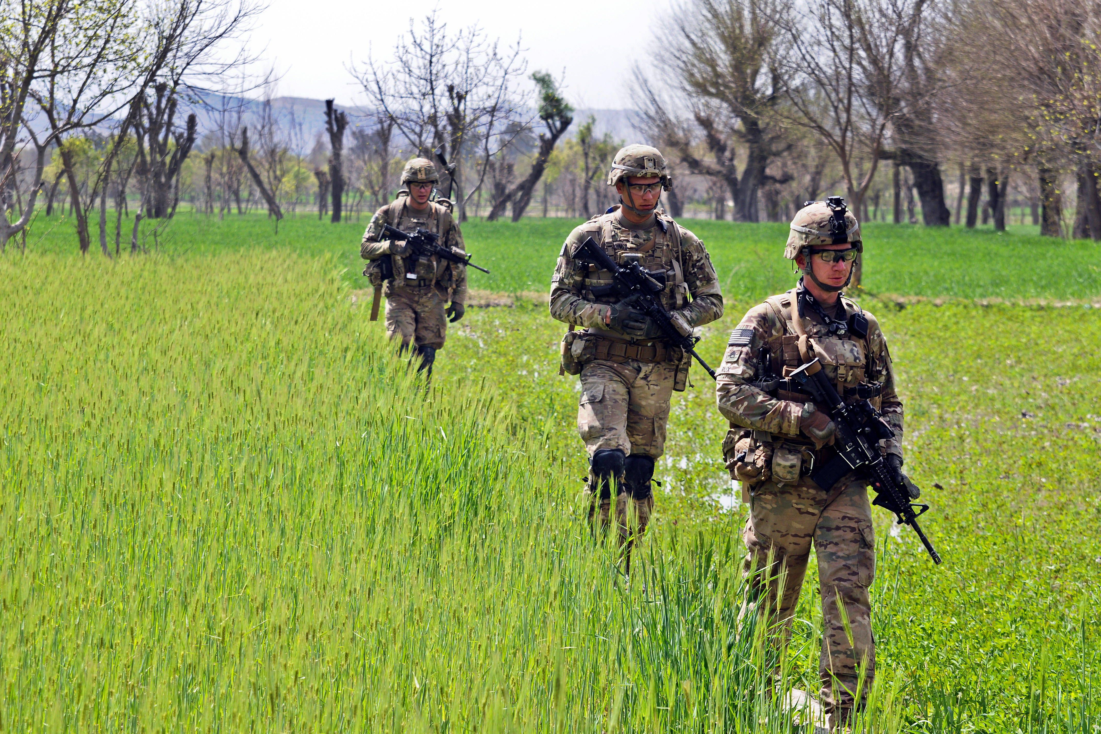 U.S. Army Staff Sgt. Tyler Rux, right, U.S. Army Sgt. Robert Addington ...