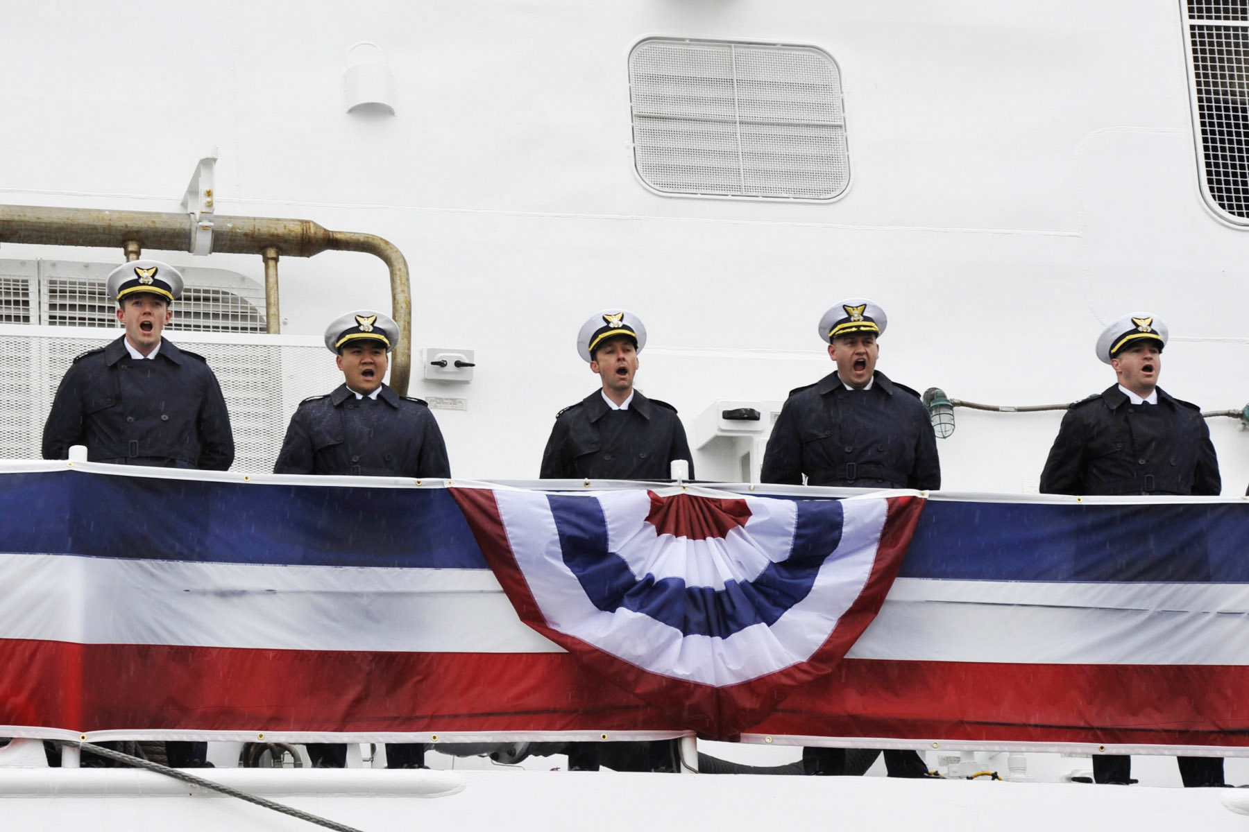 Crew members of the newly-commissioned U.S. Coast Guard Cutter Stratton ...