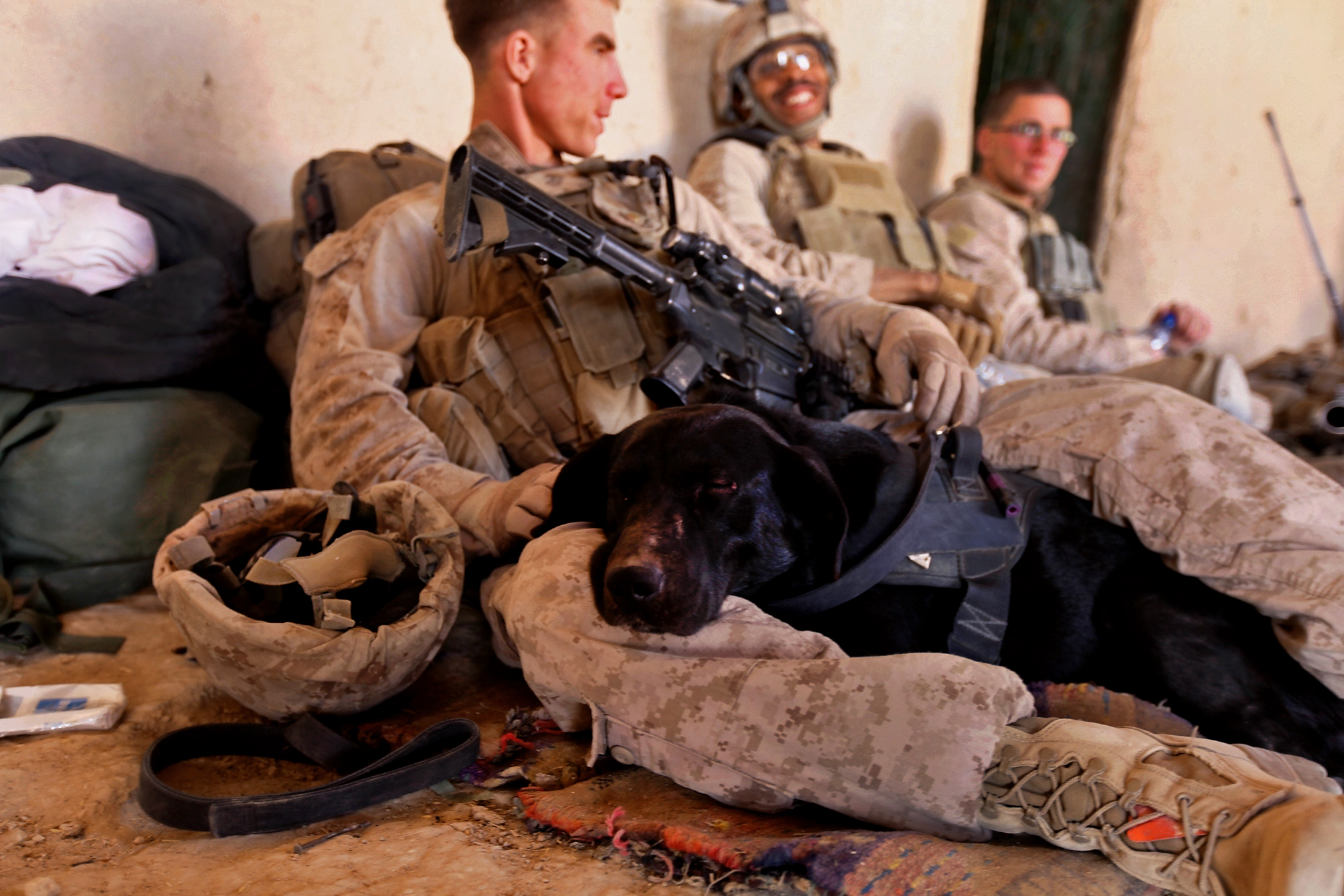 U.S. Marine Corps Lance Cpl. Dylan Bogue and other Marines take a break ...
