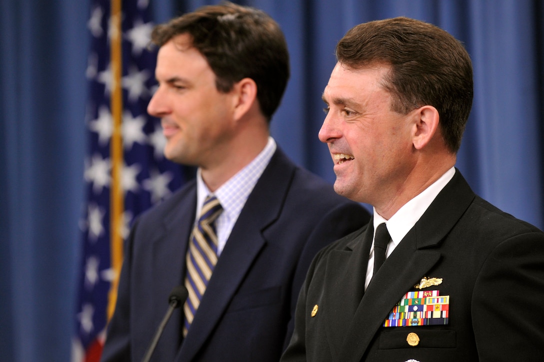 Navy Capt. James Morgan, right, mission commander for Pacific ...