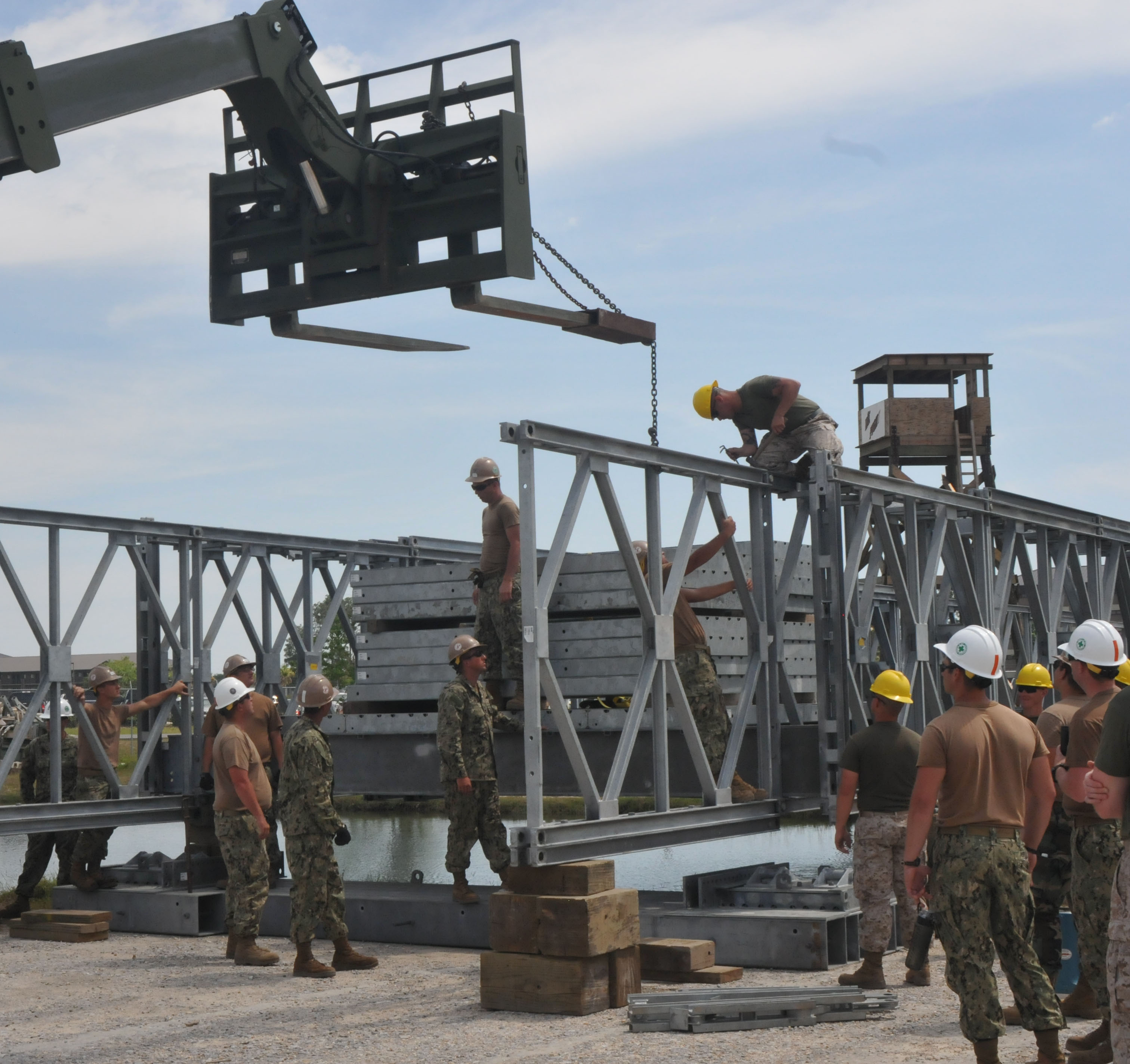 NMCB 133 Builds Bridges with Marines > Seabee Magazine > News