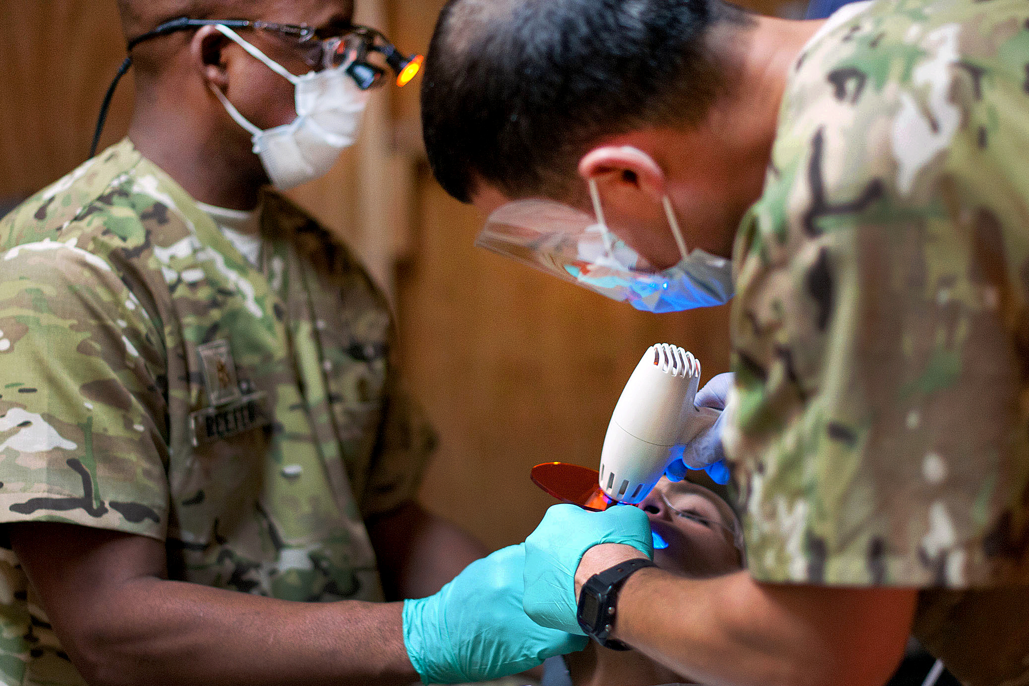 U.S. Army Spc. Francisco Roman, right, and U.S. Army Maj. Murray Reefer ...