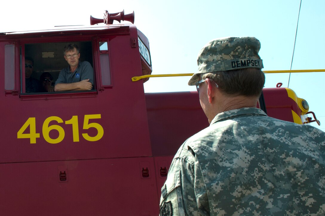 A U.S. Army civilian train conductor tells Army Gen. Martin E. Dempsey ...