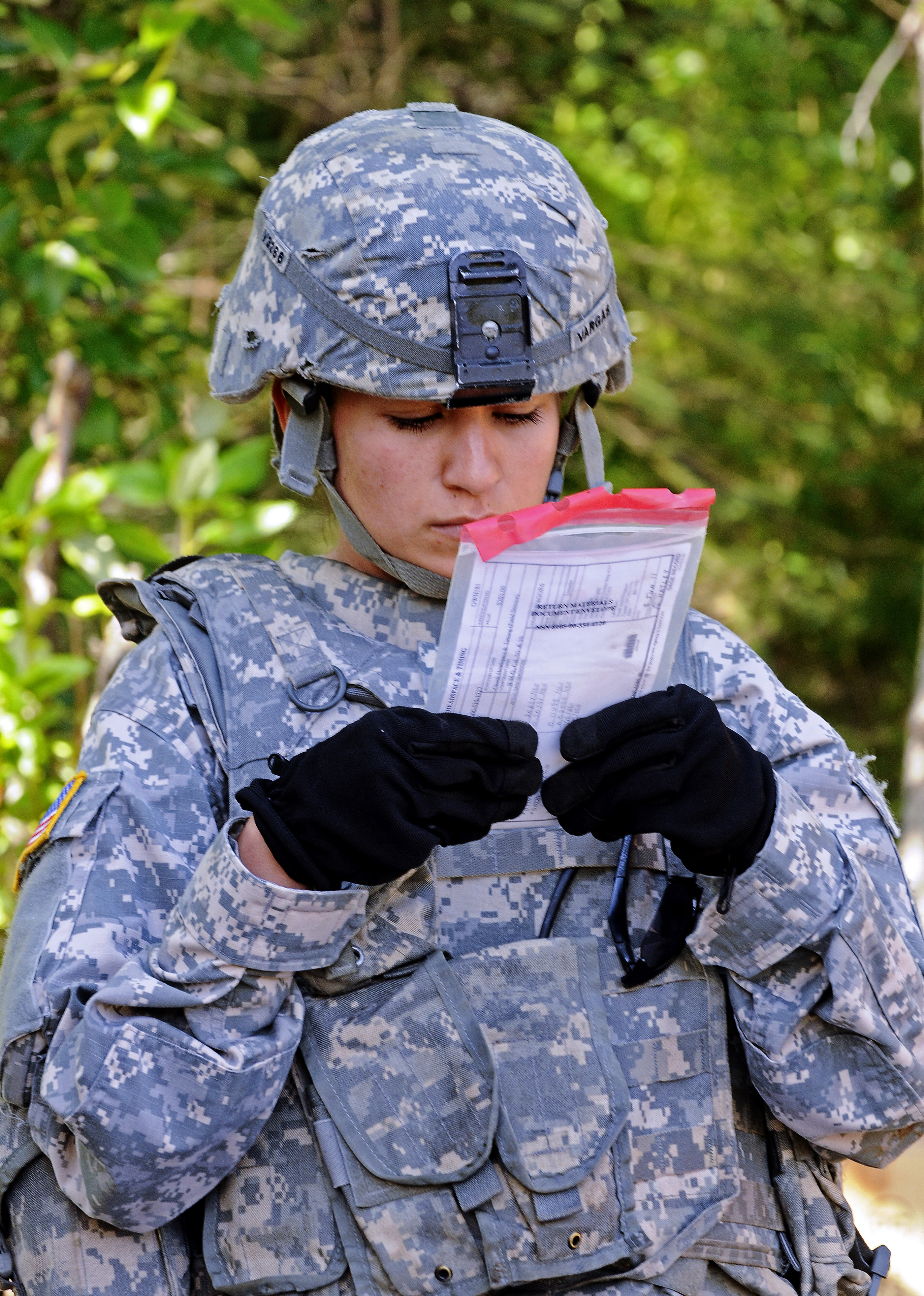 Army Sgt. Yesenia Vargas reviews her training plan on Joint Base Elmendorf-Richardson, Alaska ...