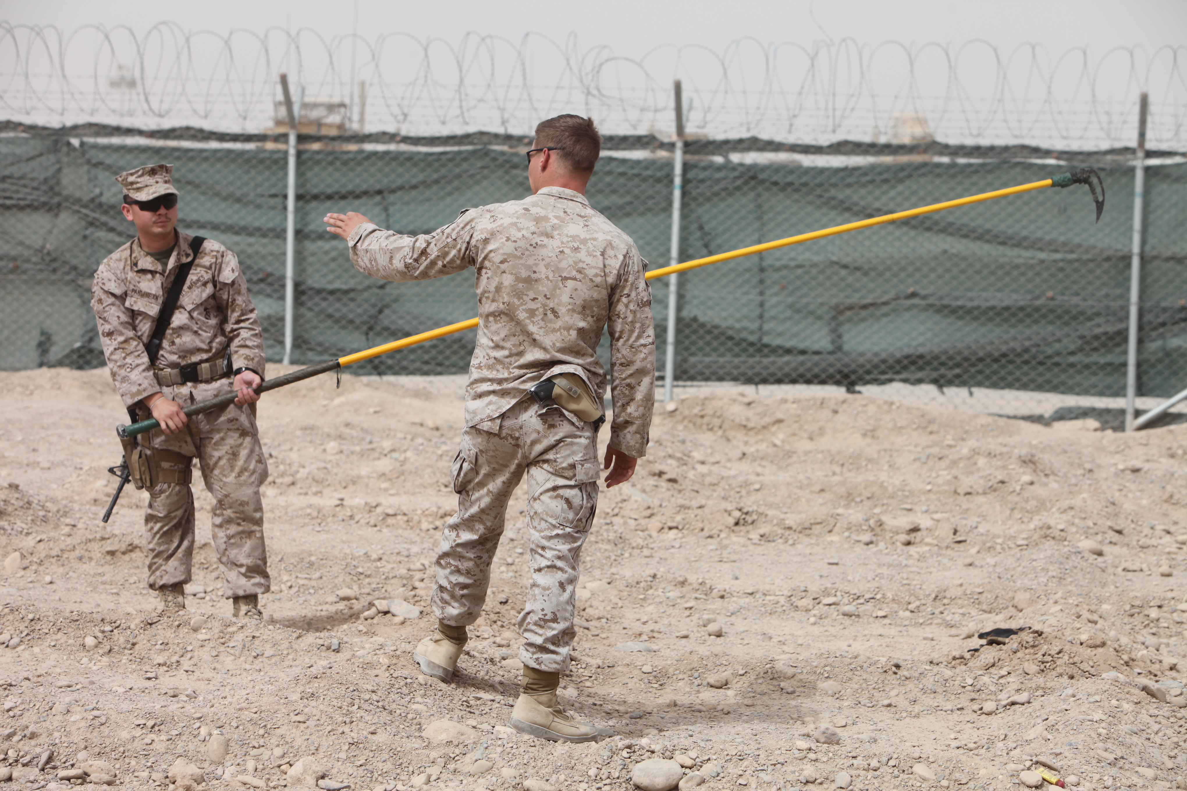 Explosive ordnance disposal technicians teach methods to counter ...