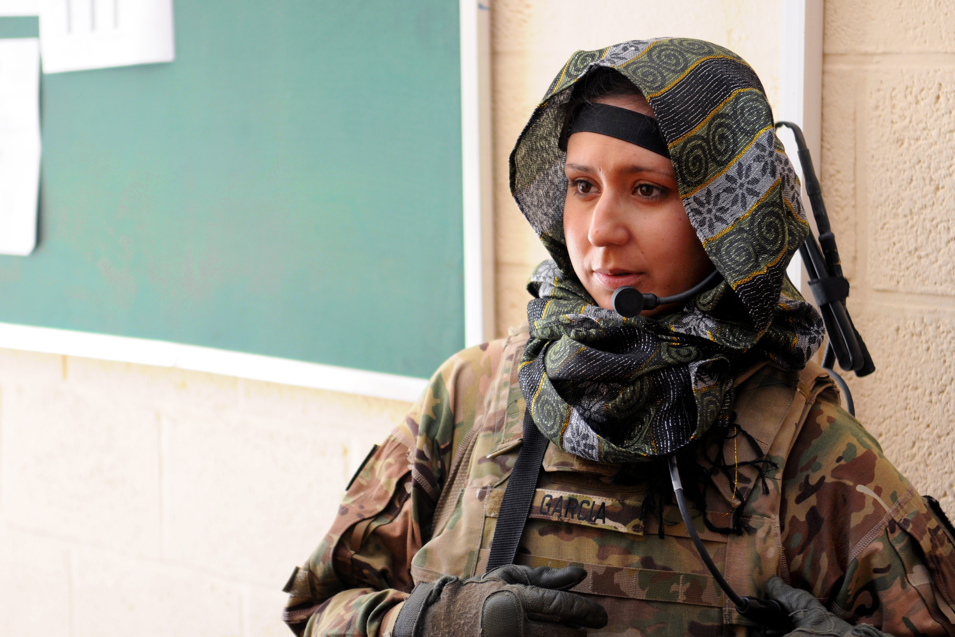 U.S. Navy Petty Officer 1st Class Megan Garcia provides security ...