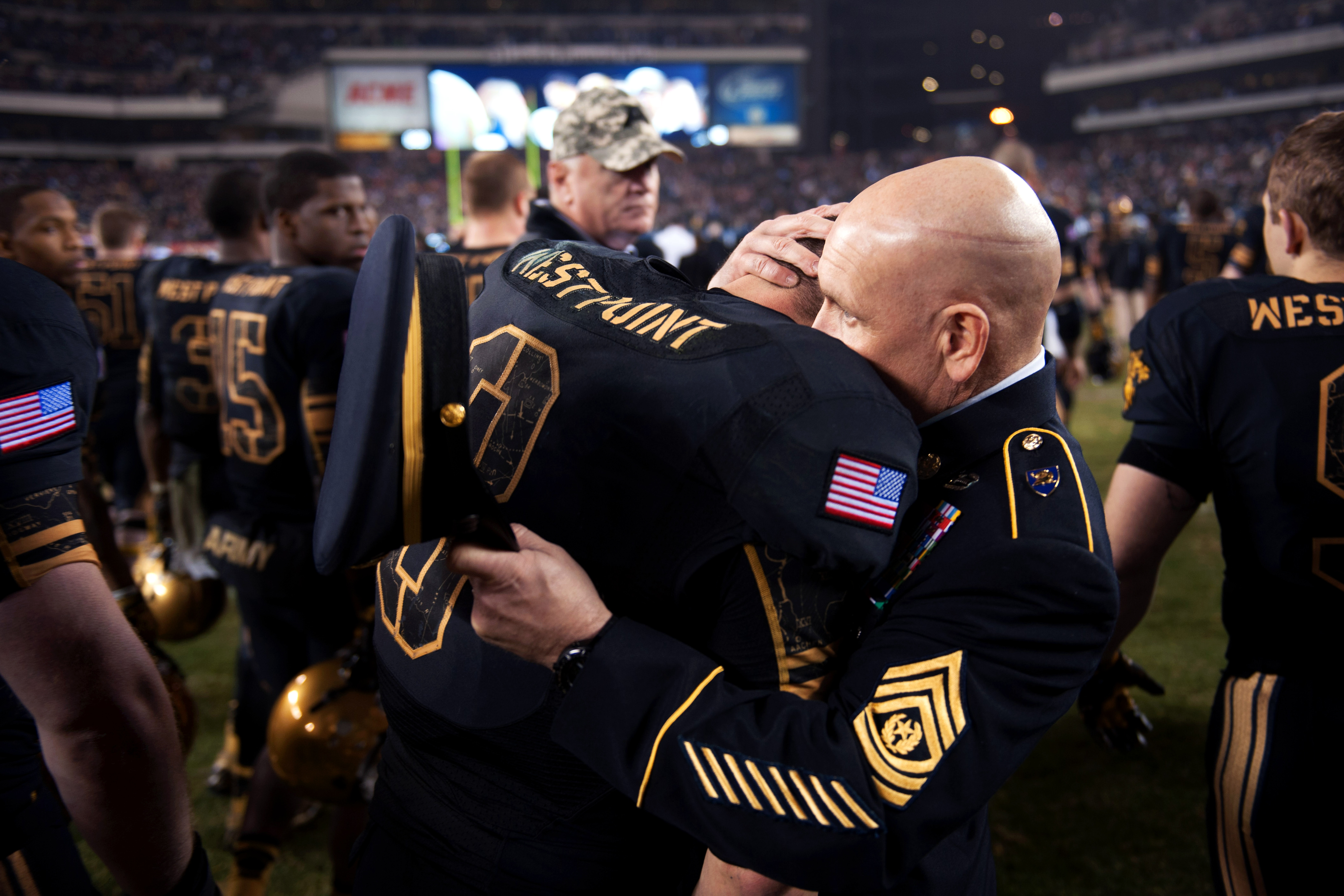 Army Command Sgt. Maj. Todd Burnett, right, command sergeant major of ...