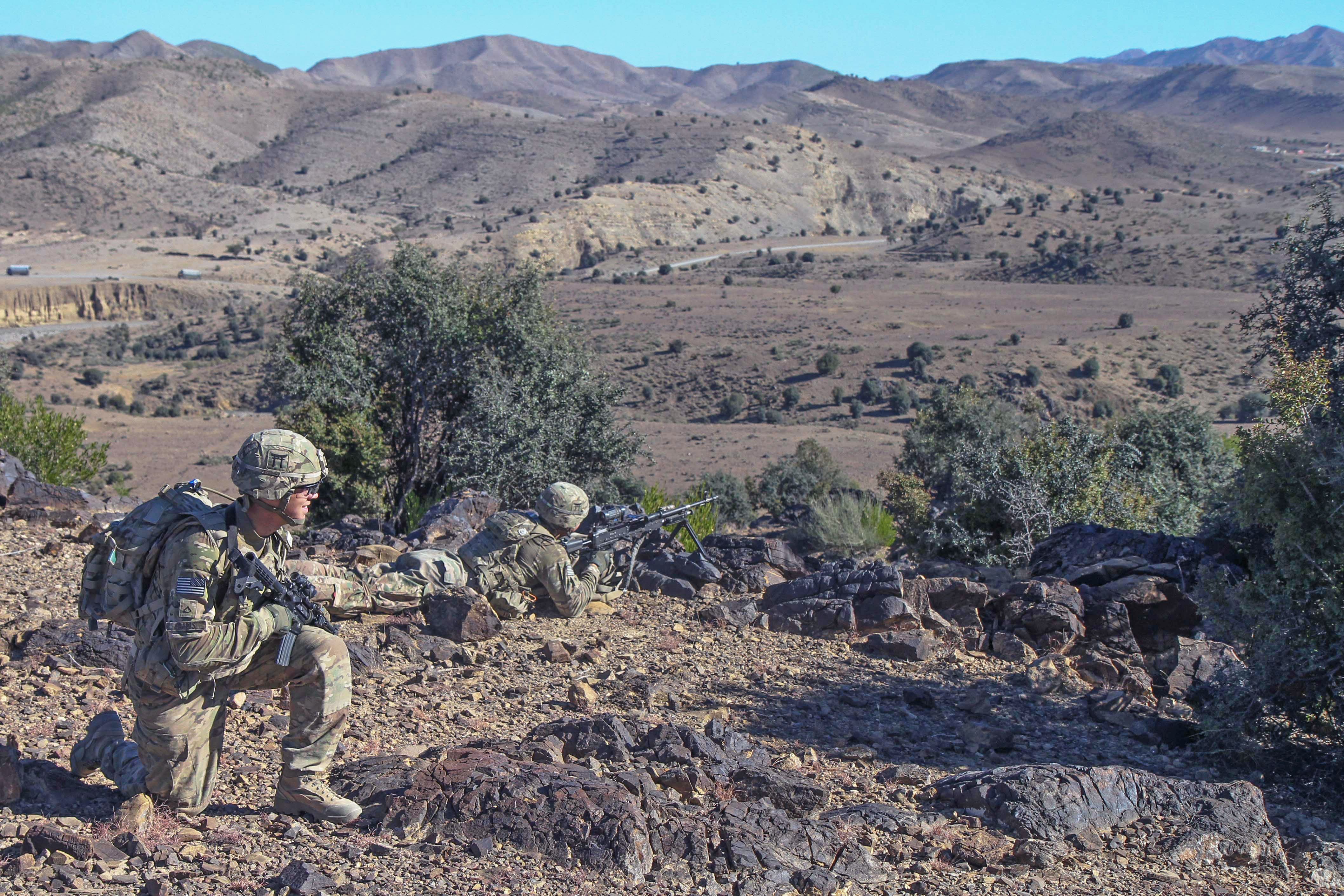 U.S. Army Pfc. Jacob Adams, left, and U.S. Army Spc. Artem Boyev, right ...