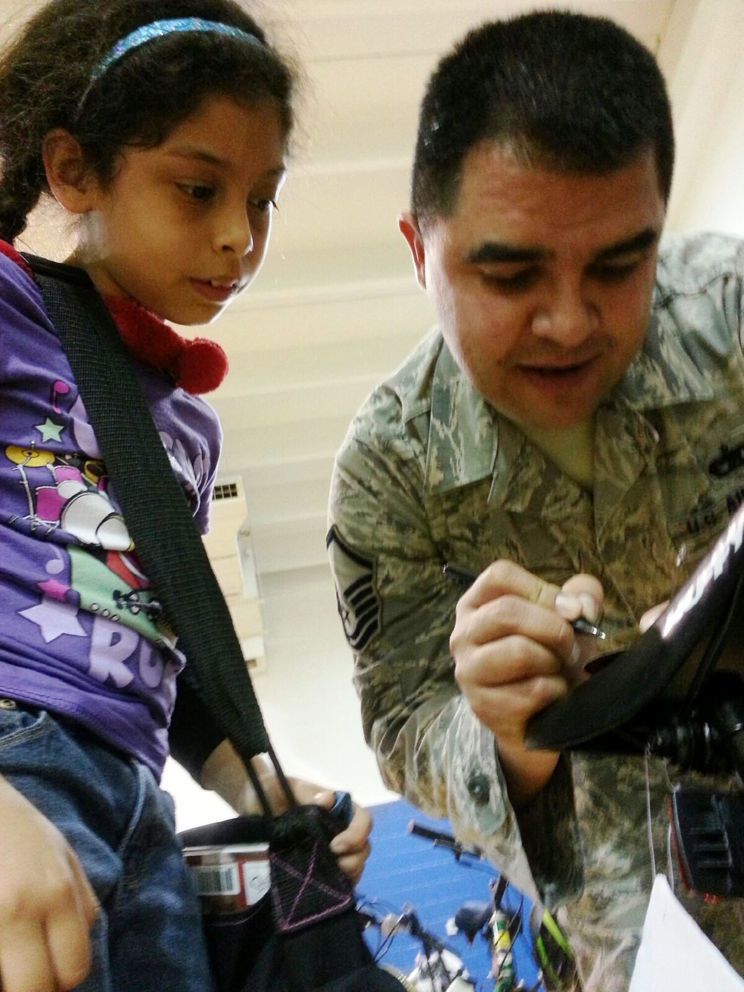 433rd Airlift Wing surprises kids with bikes > 433rd Airlift Wing ...