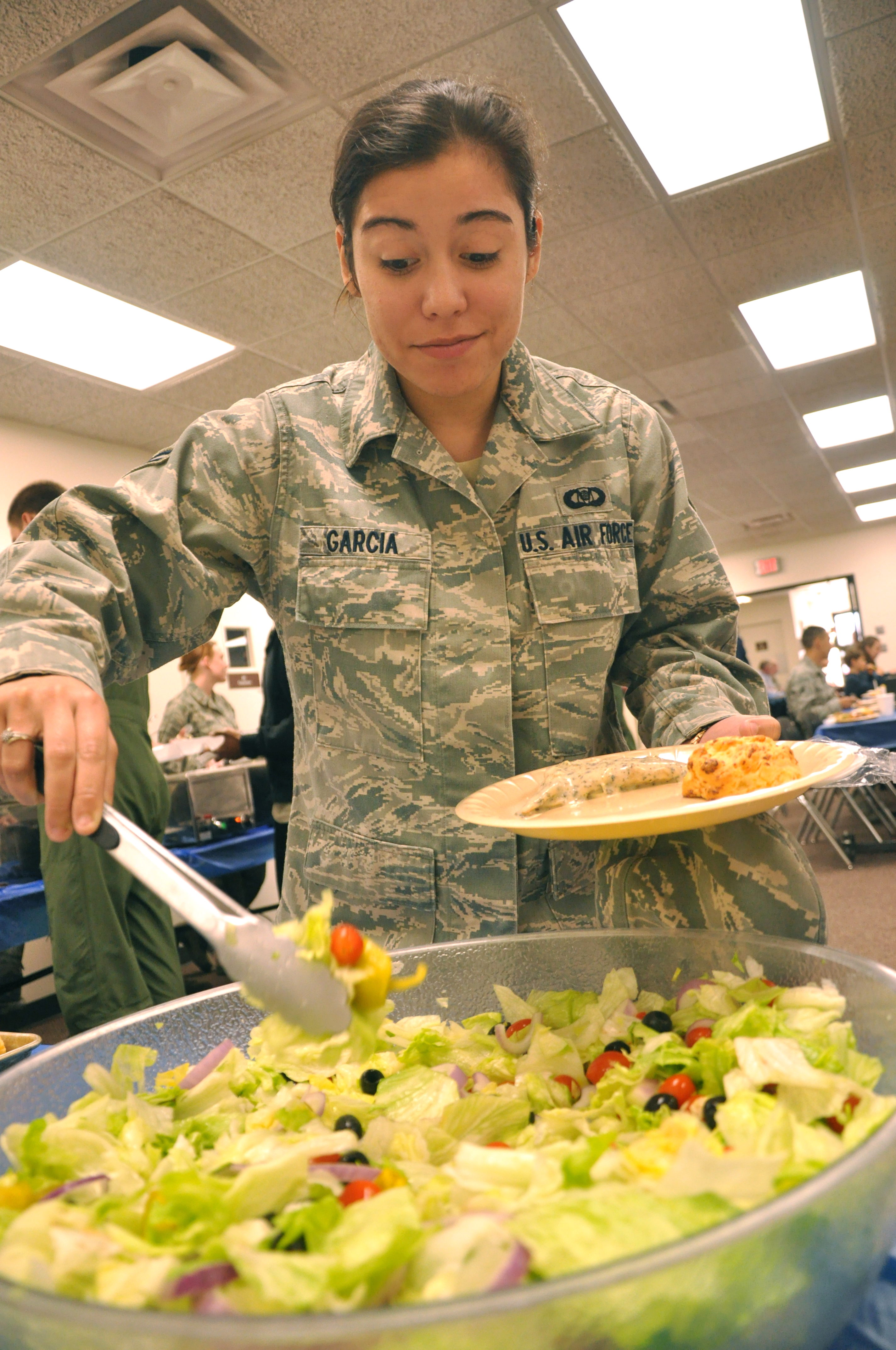 Singles enjoy home-cooked meal served by Mission Support Group > Vance ...