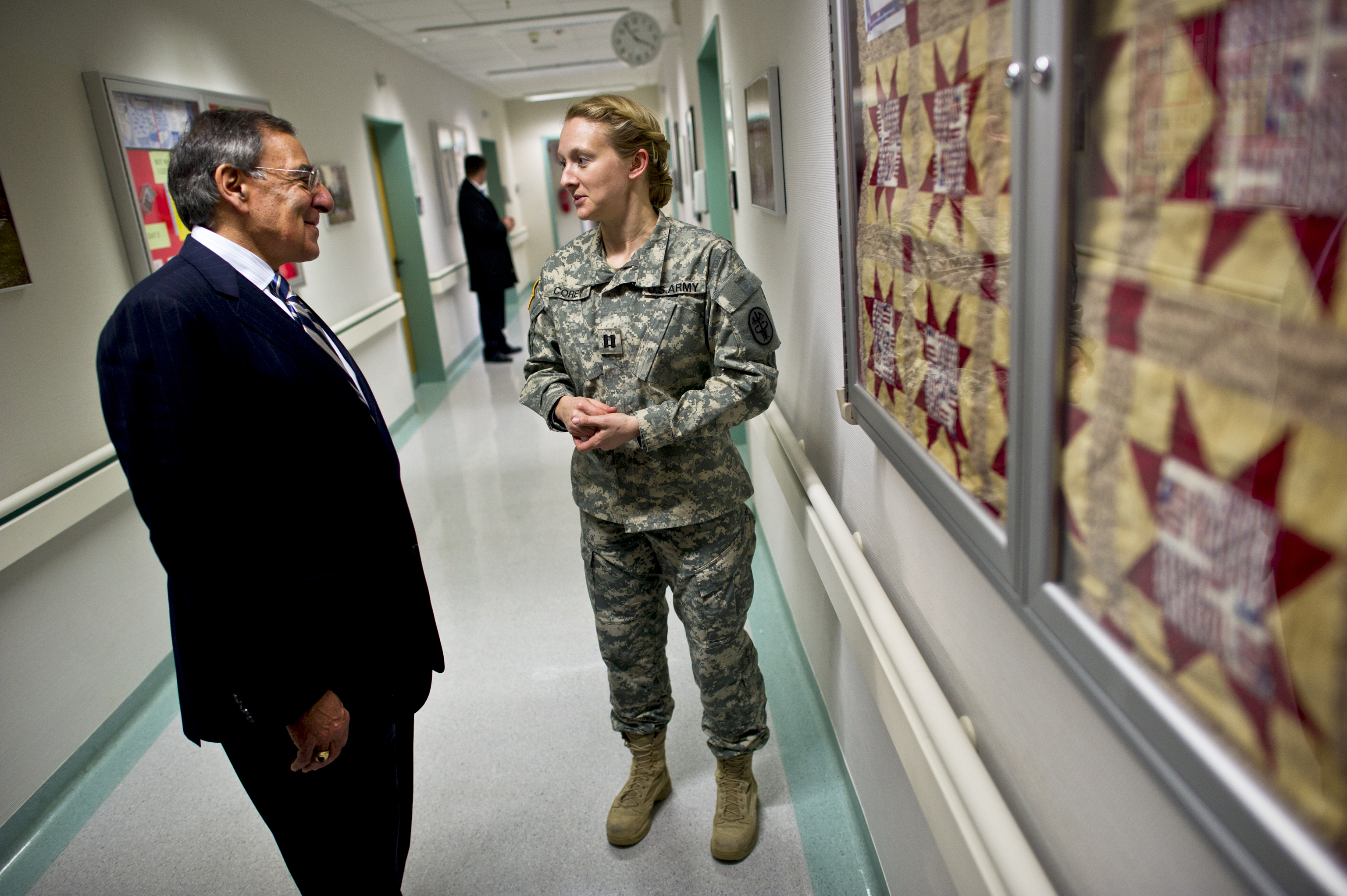 U.S. Defense Secretary Leon E. Panetta speaks with U.S. Army Capt ...