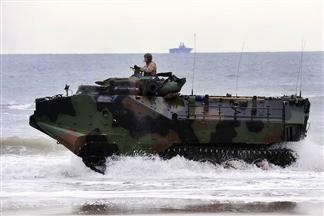 Marines drive amphibious assault vehicles along the shore. | U.S ...