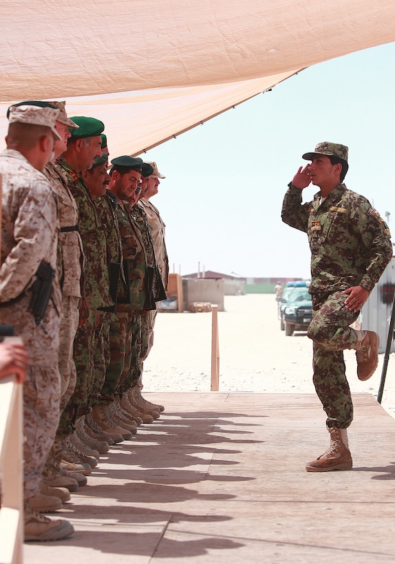 Afghan National Army soldiers listen to speeches during the graduation ...