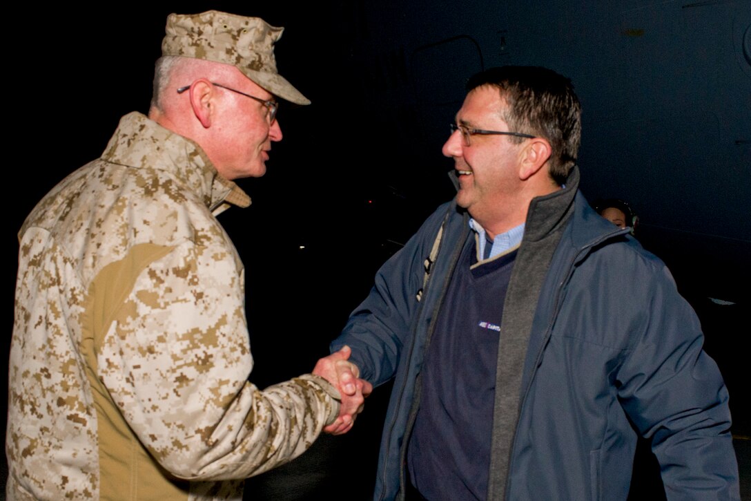U.S. Marine Corps Maj. Gen. James Laster, left, greets U.S. Deputy ...