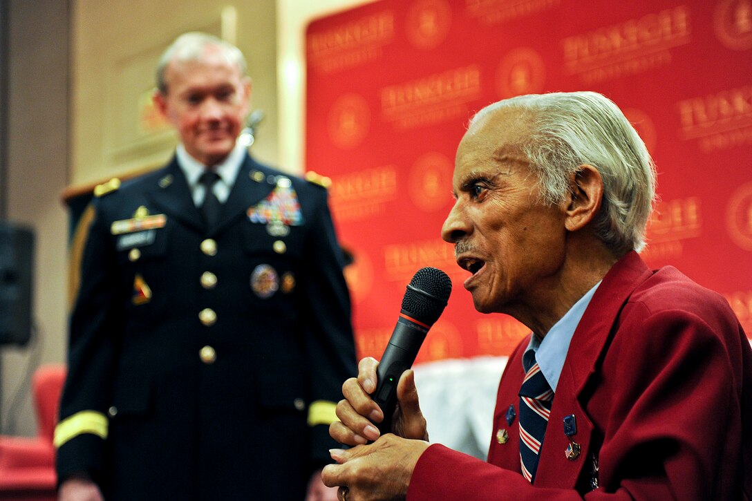 Retired Tuskegee Airman Lt. Col. Herbert Carver addresses the audience ...